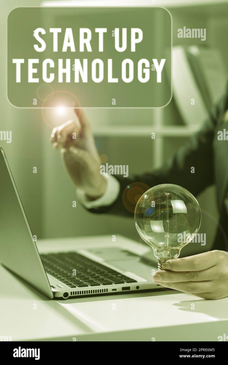 Hand writing sign Start Up Technology, Word Written on Young Technical Company initially Funded ...