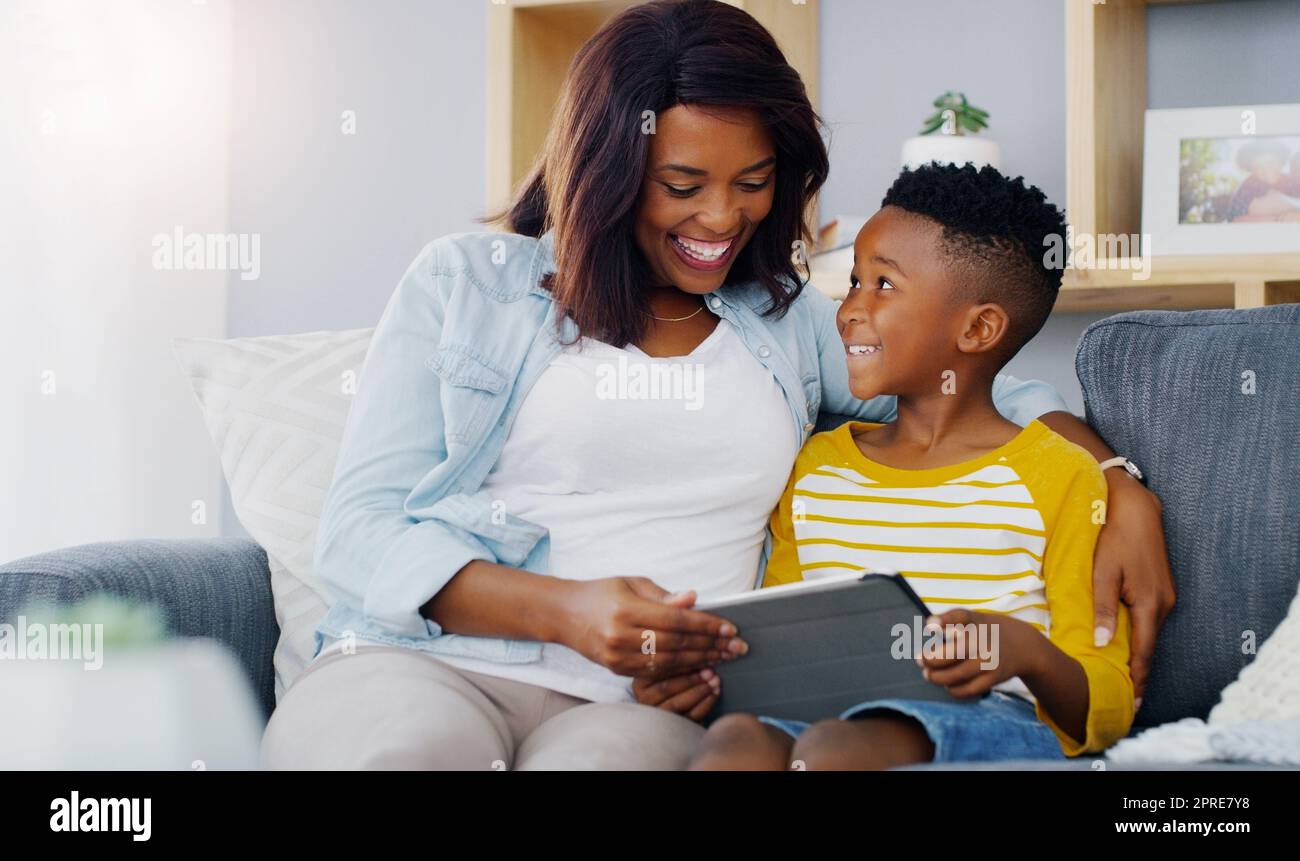 These apps always keep us entertained. an adorable little boy using a ...