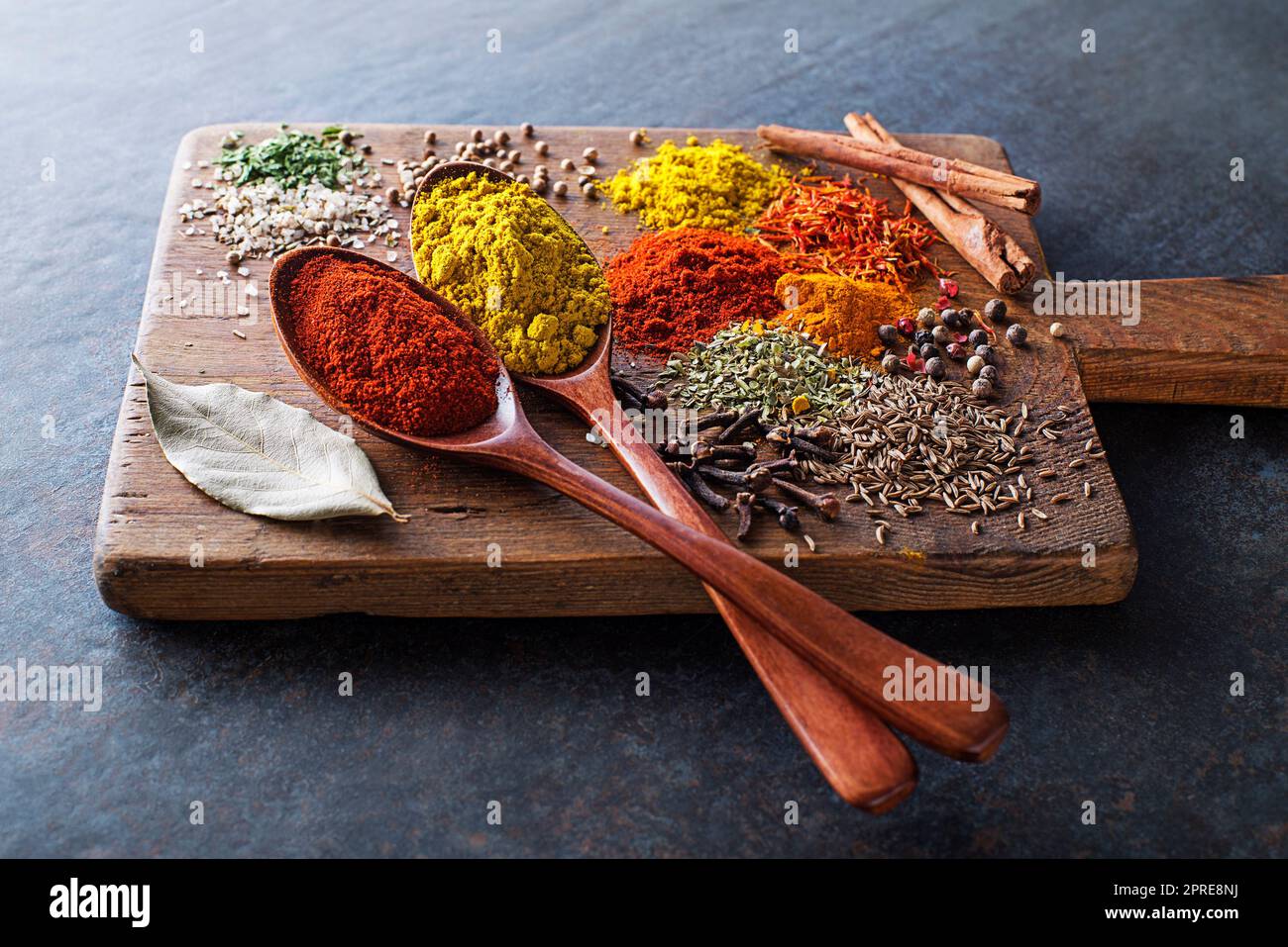 Colorful herbs and spices for cooking dishes. Indian and Asian spices ...