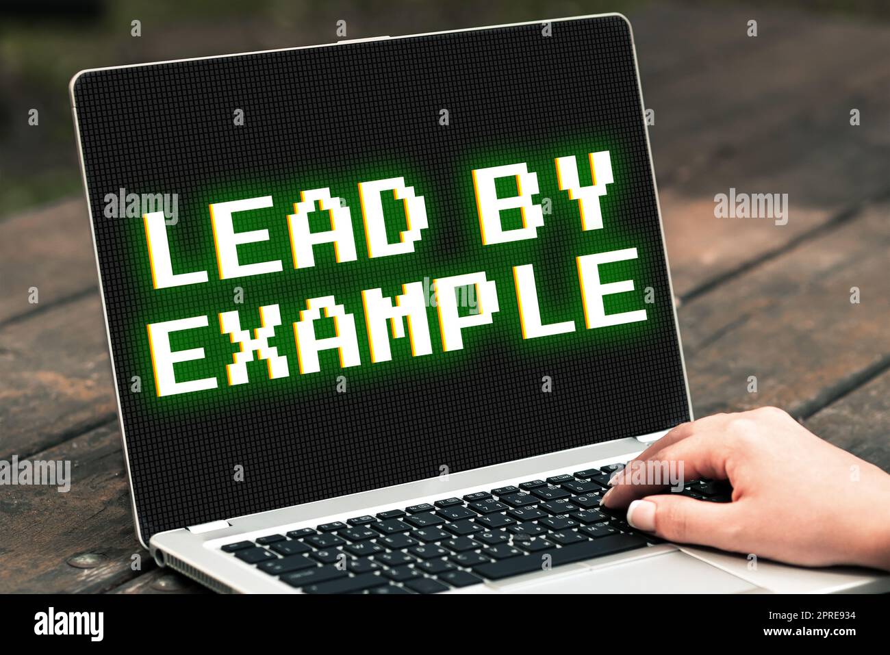 Sign displaying Lead By Example, Business showcase Be a mentor leader ...