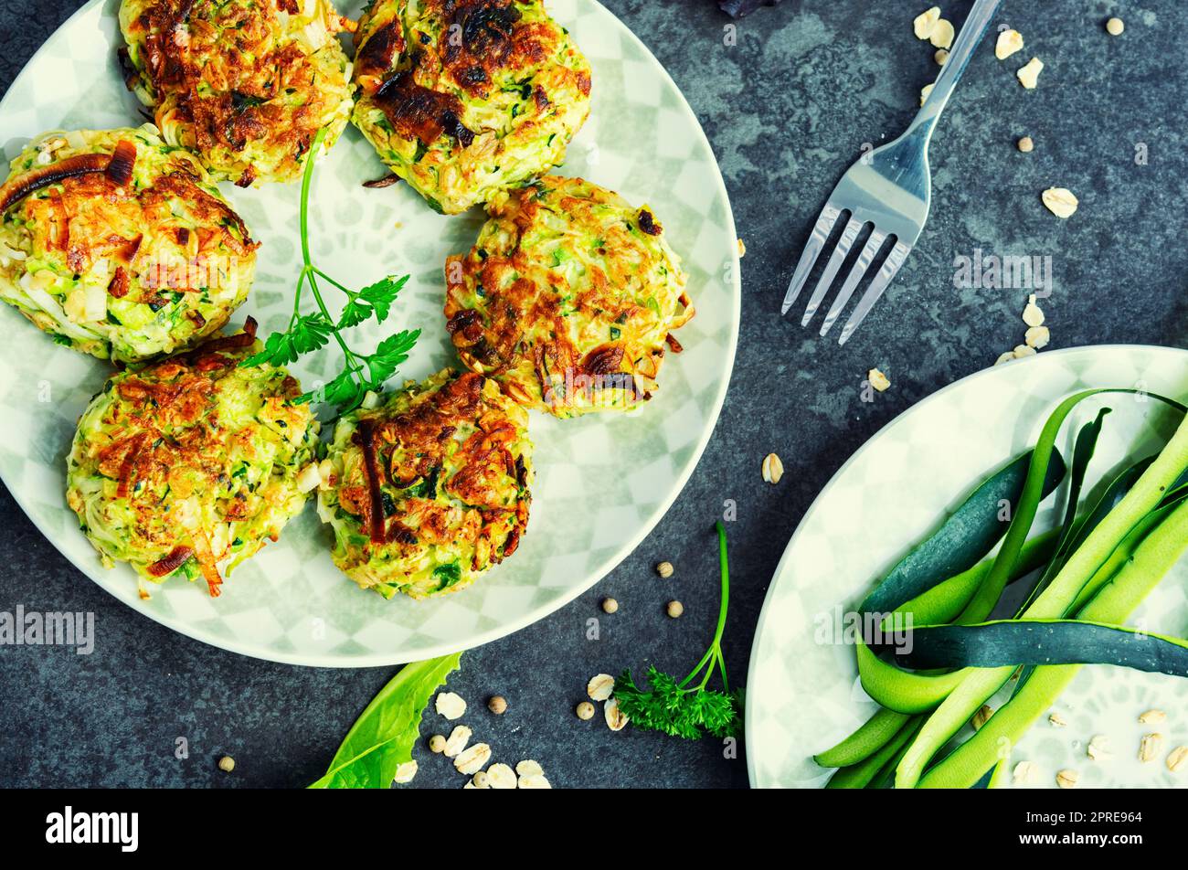 Vegan rissole from zucchini, oatmeal and greens. Healthy food Stock ...