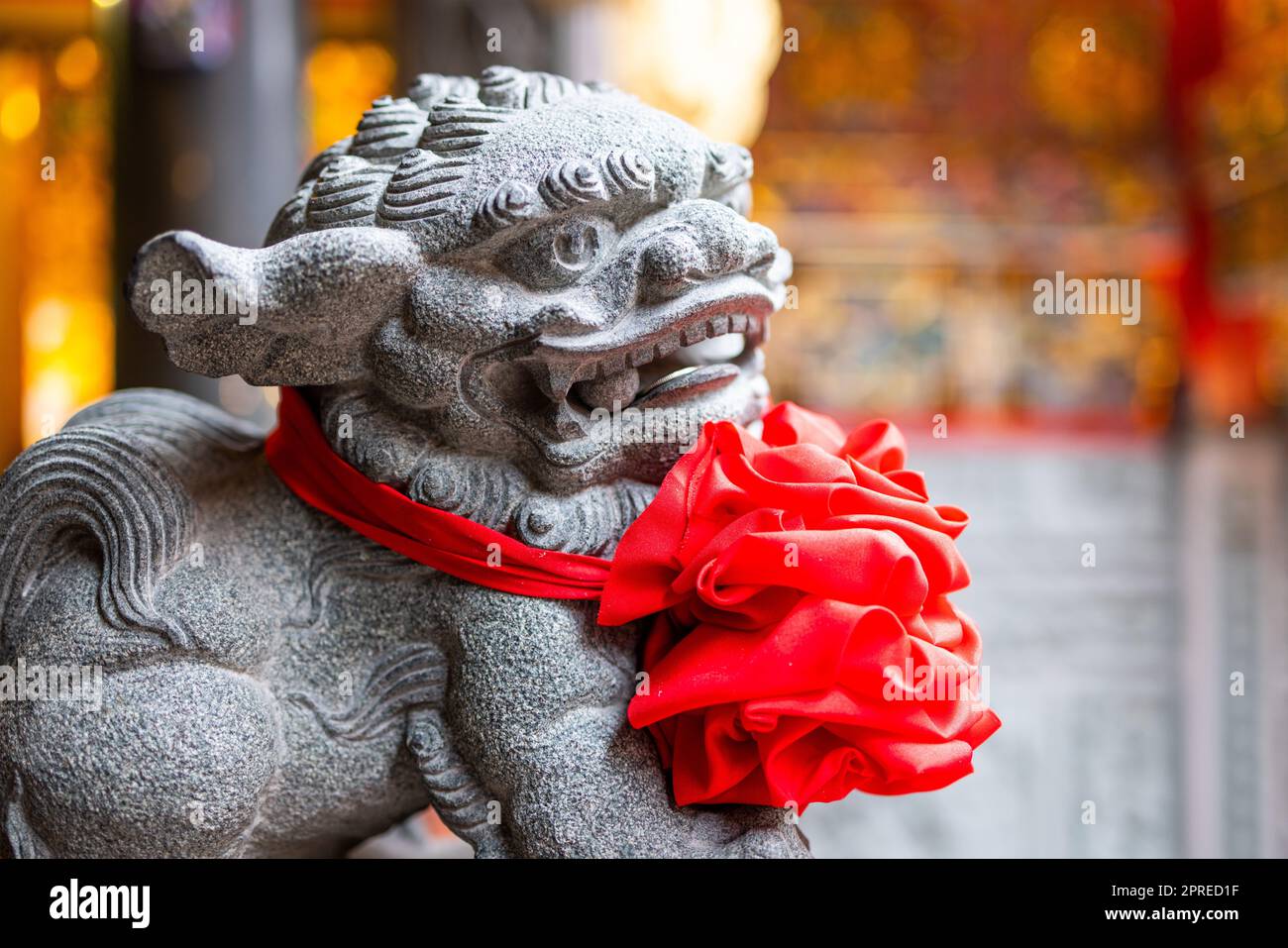 Lion Rock stone statues in chinese temple Stock Photo - Alamy