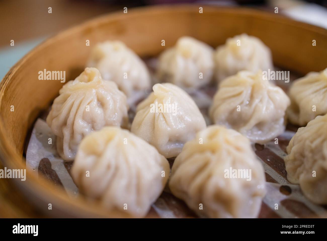 Taiwan cuisine steamed soup bun in basket Stock Photo - Alamy