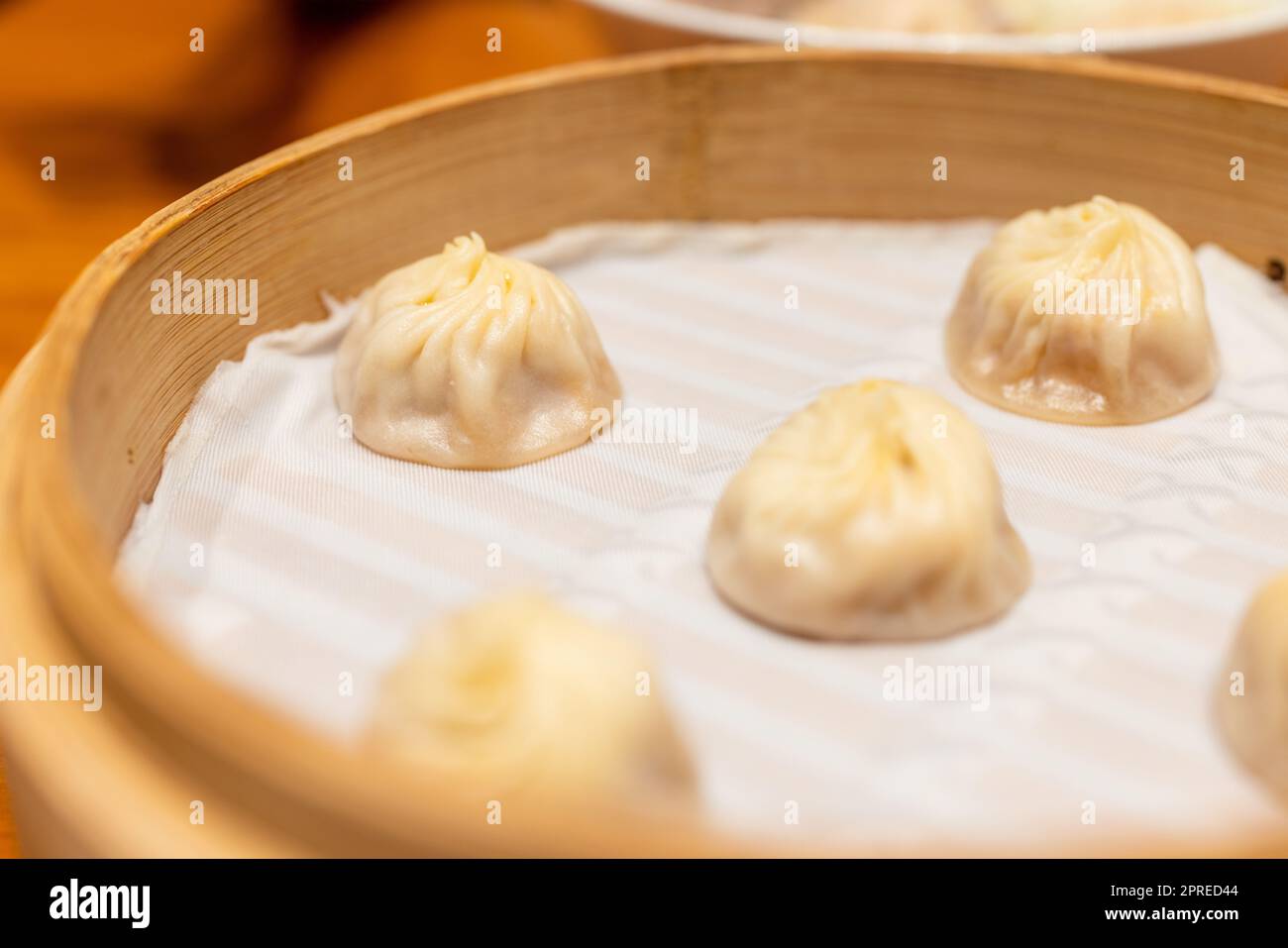 Chinese style steamed soup bun in restaurant Stock Photo - Alamy