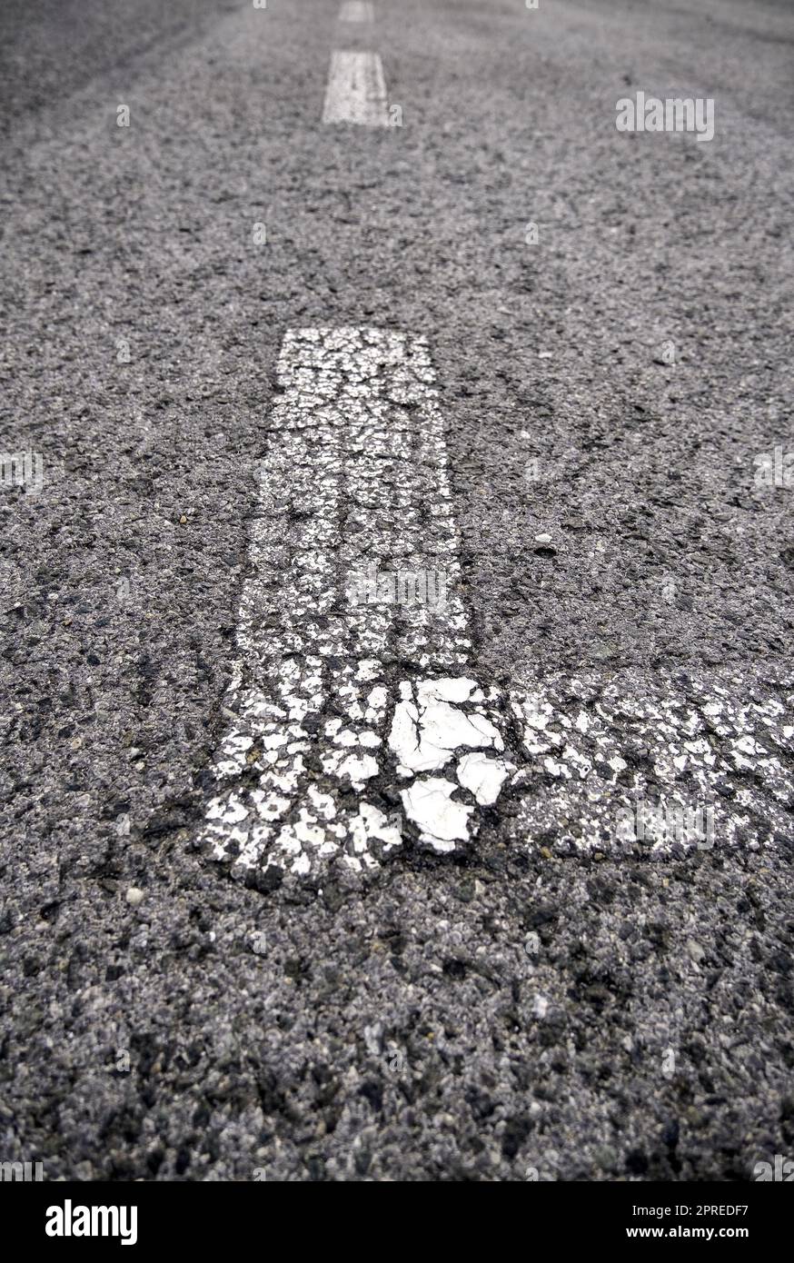 Marking lines on the asphalt, information sign Stock Photo - Alamy