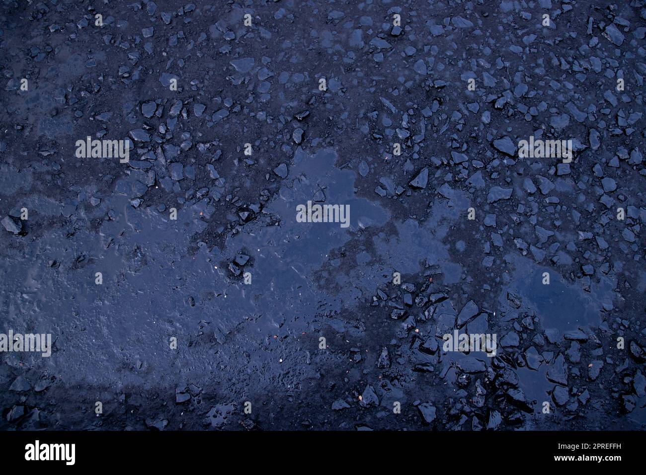 Black Raw bitumen mosaic road stone Texture background Stock Photo - Alamy