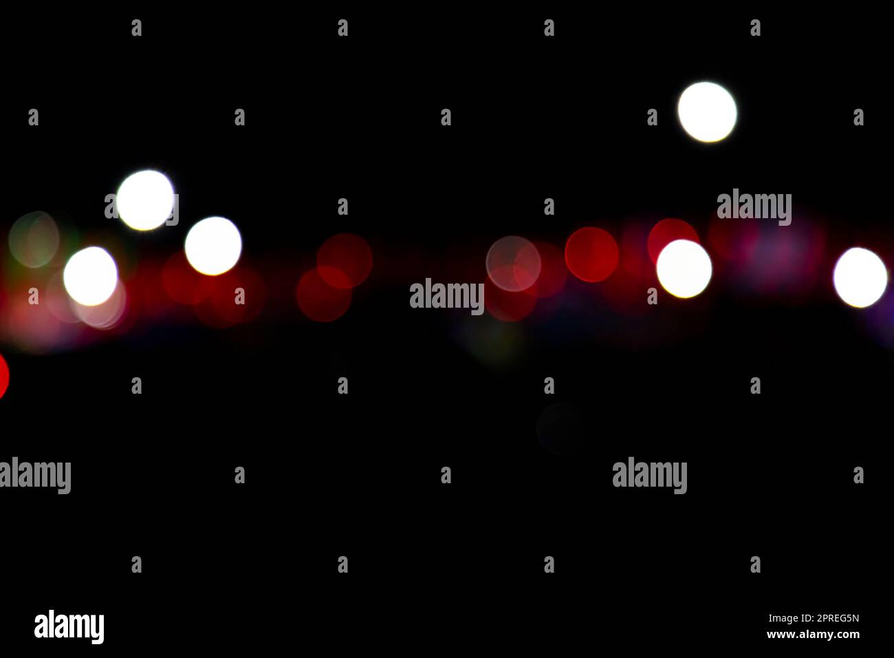 Abstract colorful bokeh light effects on the night black background ...