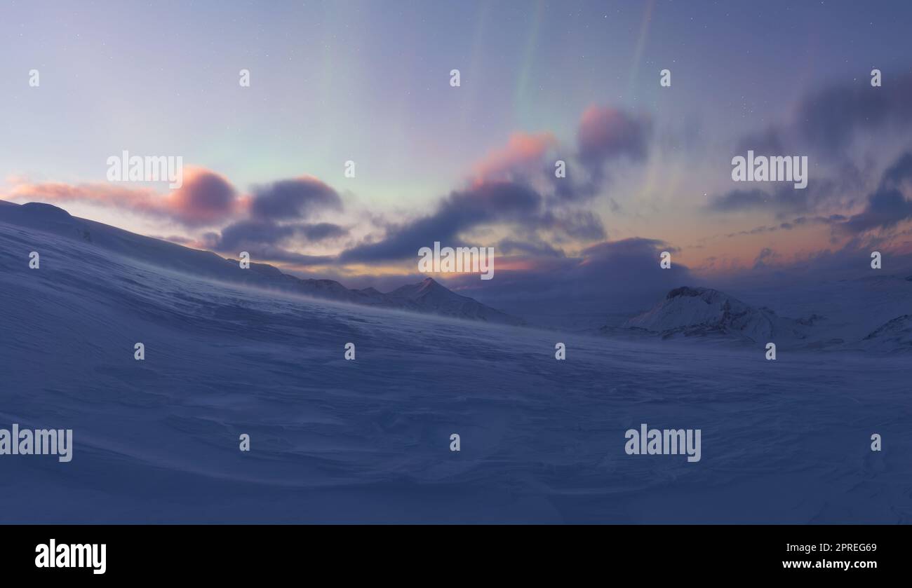 The Icelandic landscape at dusk, on the edge of a glacier with the ...