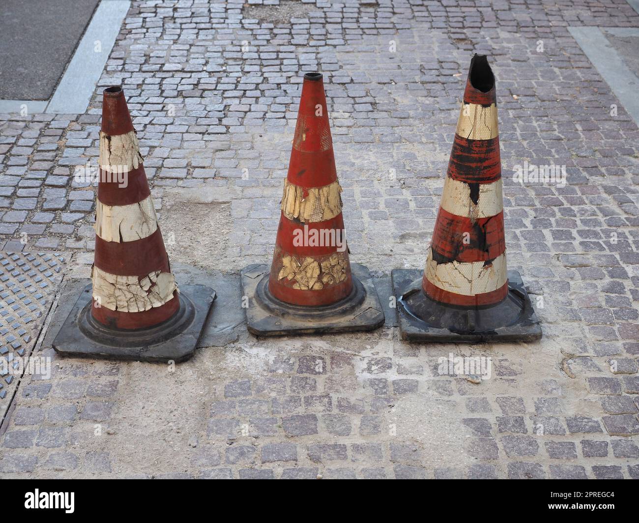 three traffic cones to mark road works or temporary obstruction traffic ...