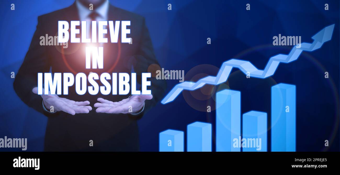 Sign displaying Believe In Impossible, Word for motivation and ...