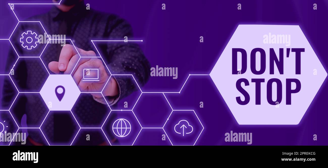 Sign displaying Don T Not Stop, Word for Continue what had been doing ...