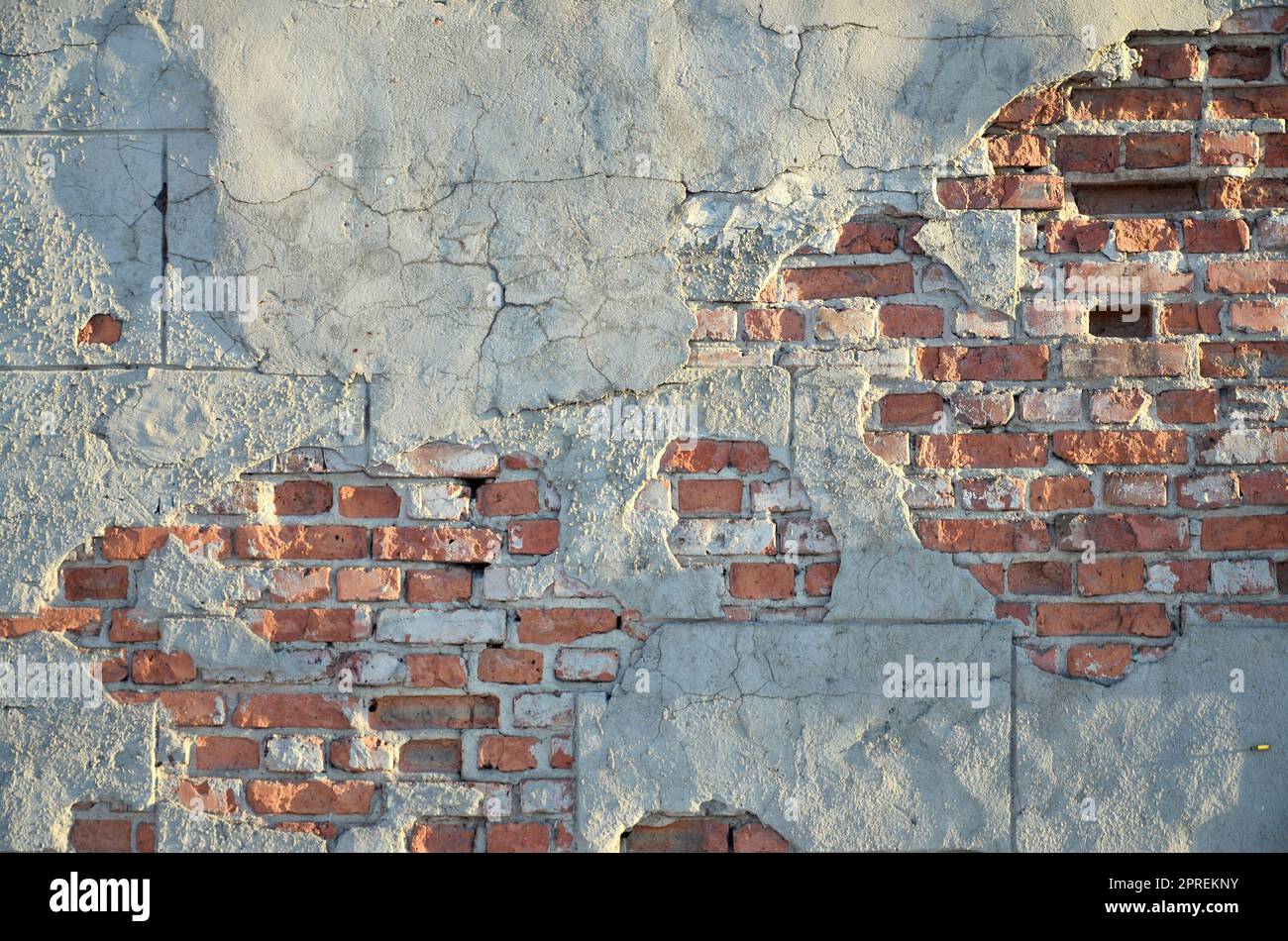 Weathered stained brick wall with cracked cement tension Stock Photo ...
