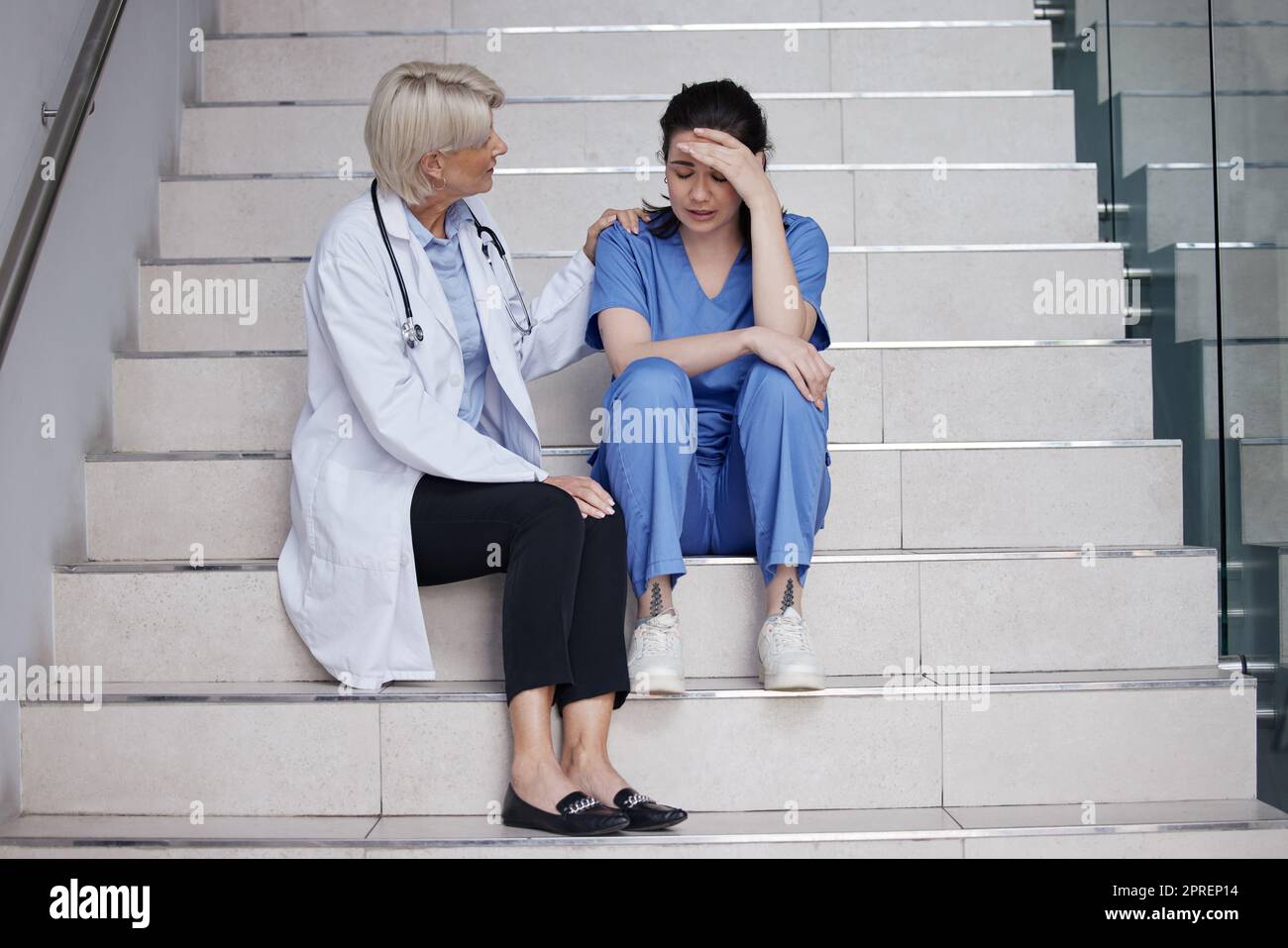 Helping someone sad hi-res stock photography and images - Alamy