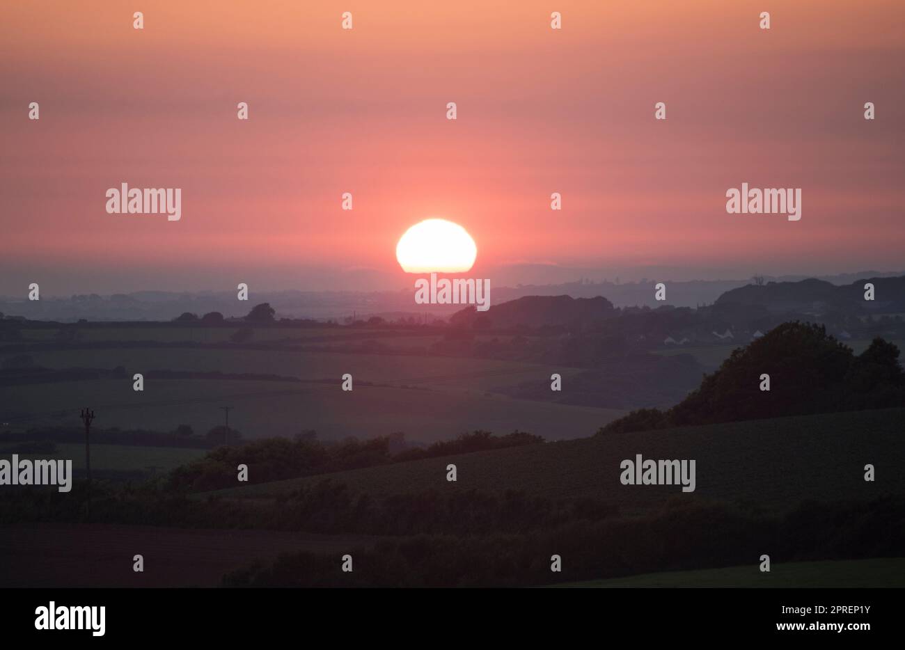 Sunsetting over the countryside of the Lizard Peninsula in Cornwall ...