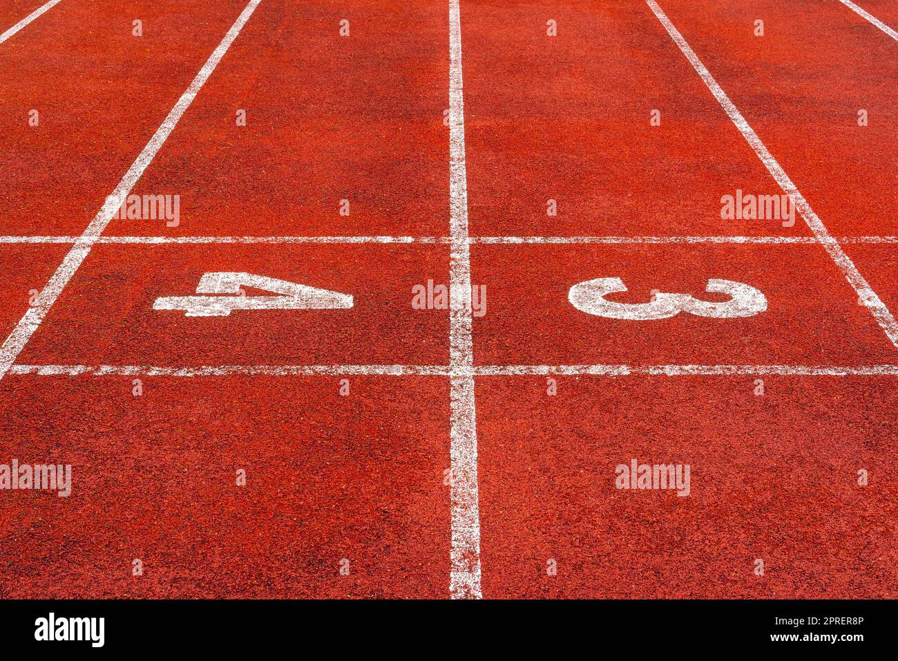 Start points with numbers 3 and 4 on running track or athlete track in ...