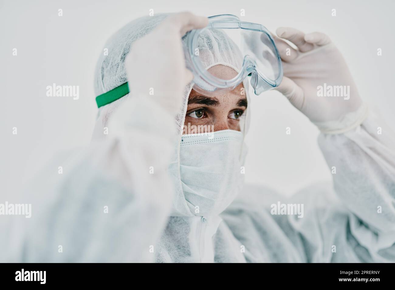 Scientist wearing protective goggles hi-res stock photography and ...