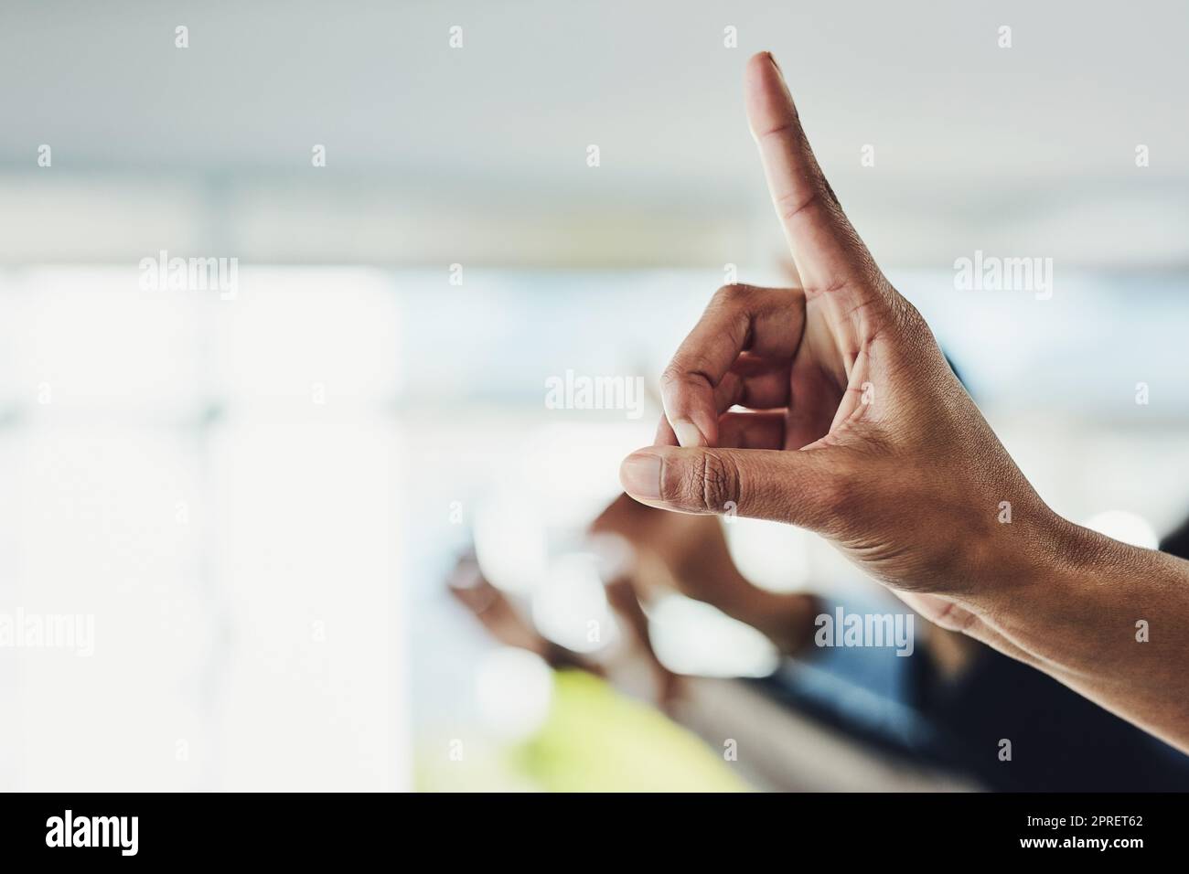 Raised hand at business meeting hi-res stock photography and images - Alamy