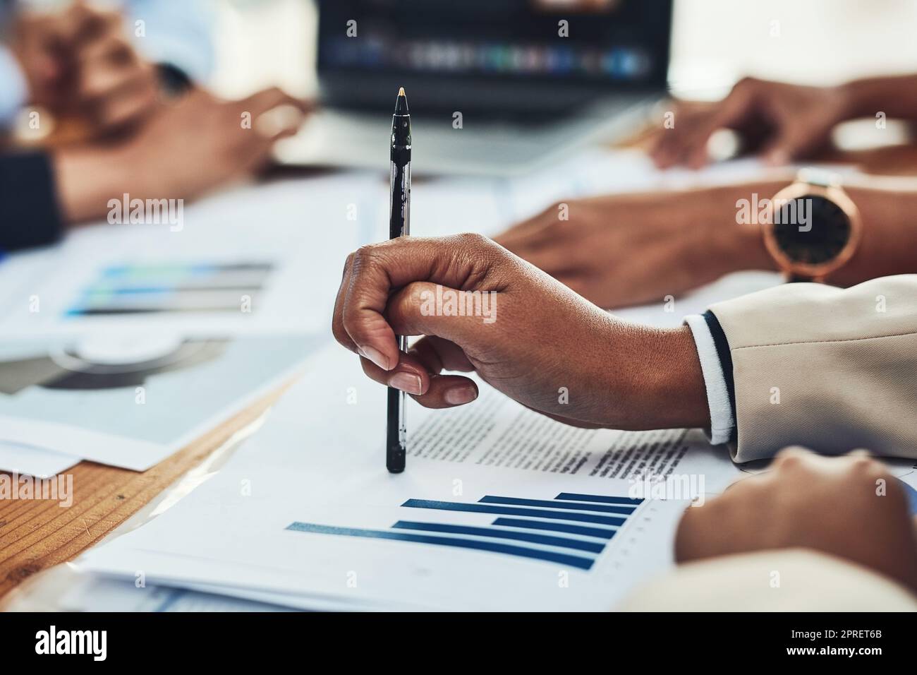 Business people in a corporate finance meeting, planning with documents ... Business people in a corporate finance meeting, planning with documents ...