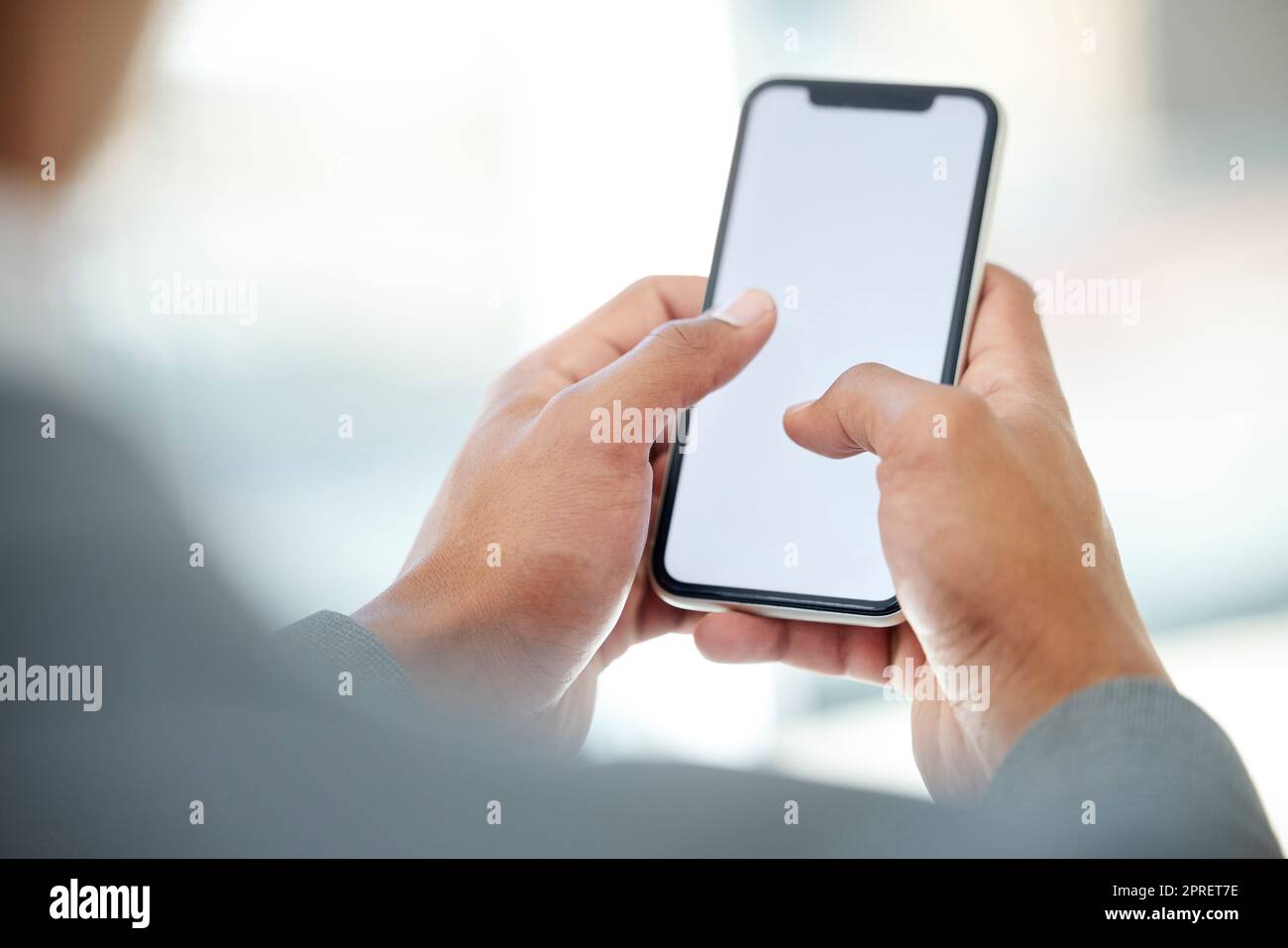 Dont be a stranger. an unrecognizable businessman using his cellphone ...