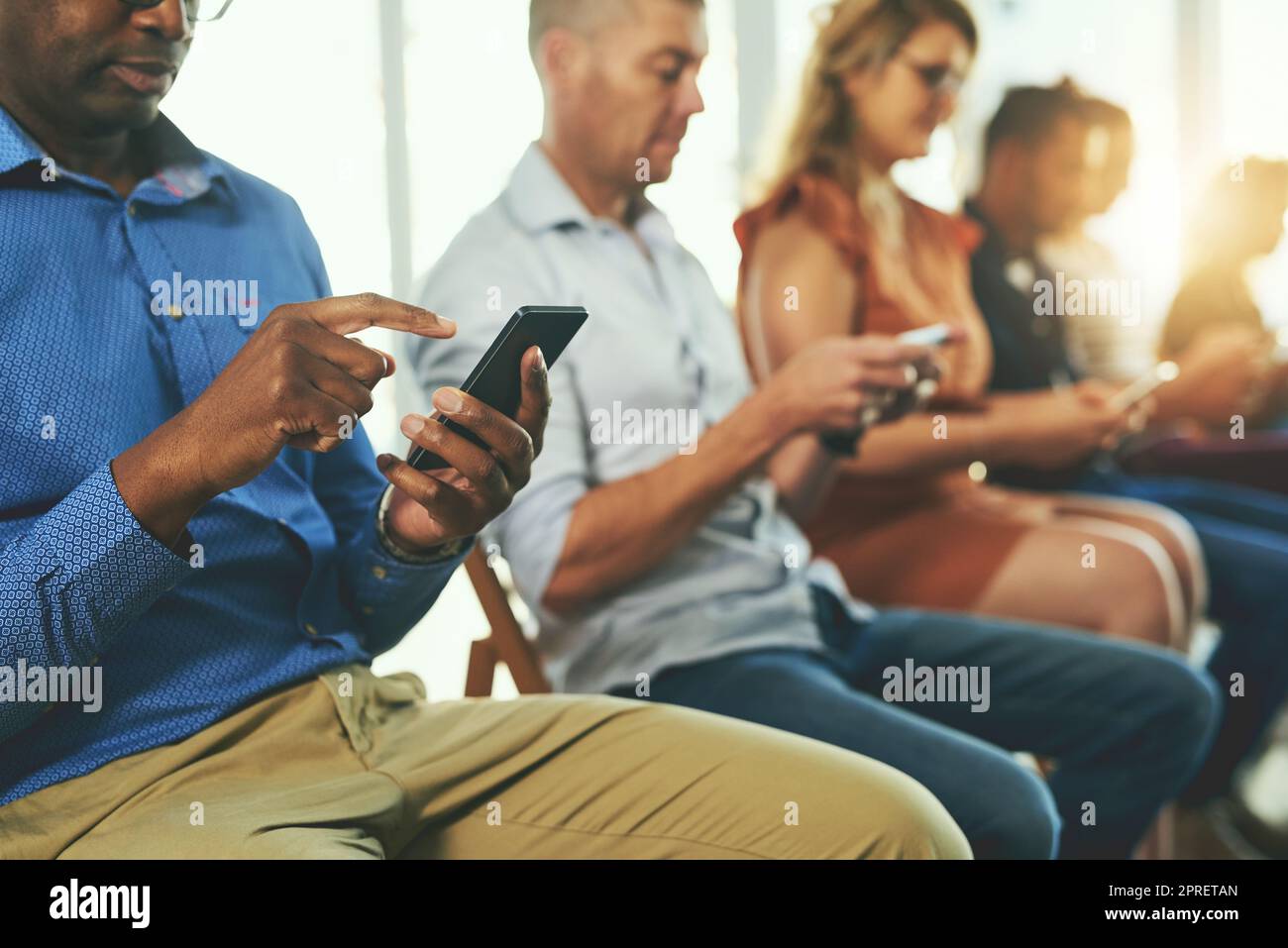 Row of mobile phones hi-res stock photography and images - Alamy