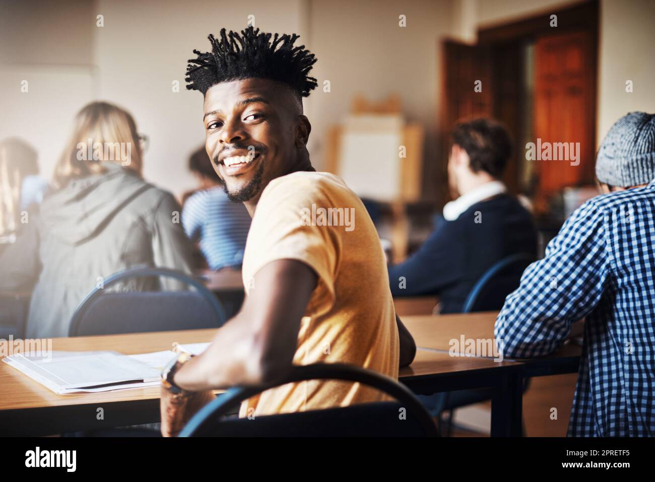 The class that is full of hard working students. university students in ...