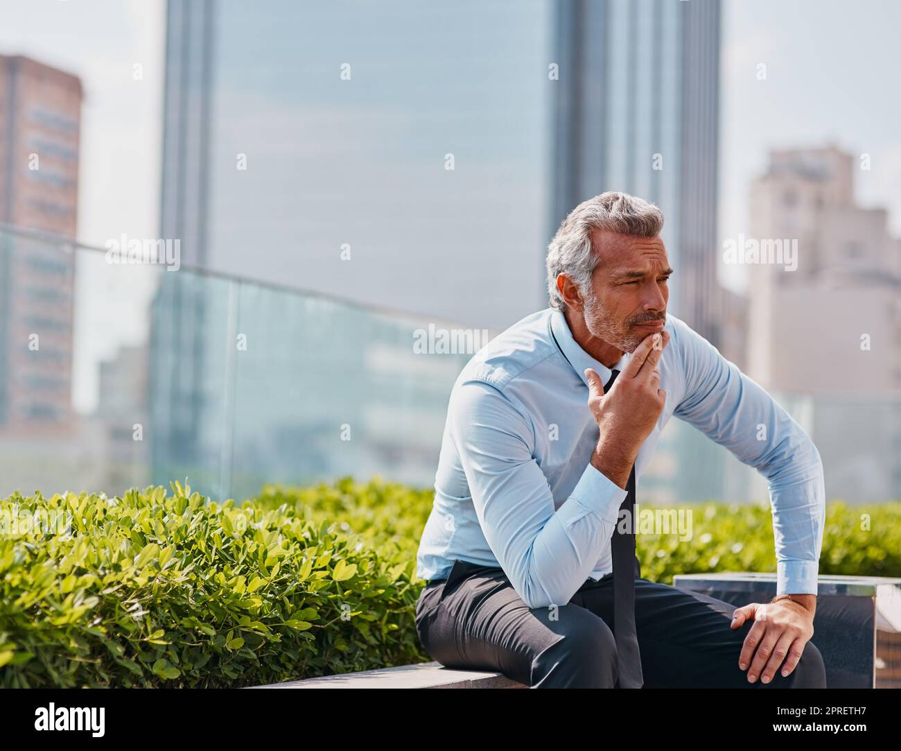 Businessperson contemplating hi-res stock photography and images - Alamy