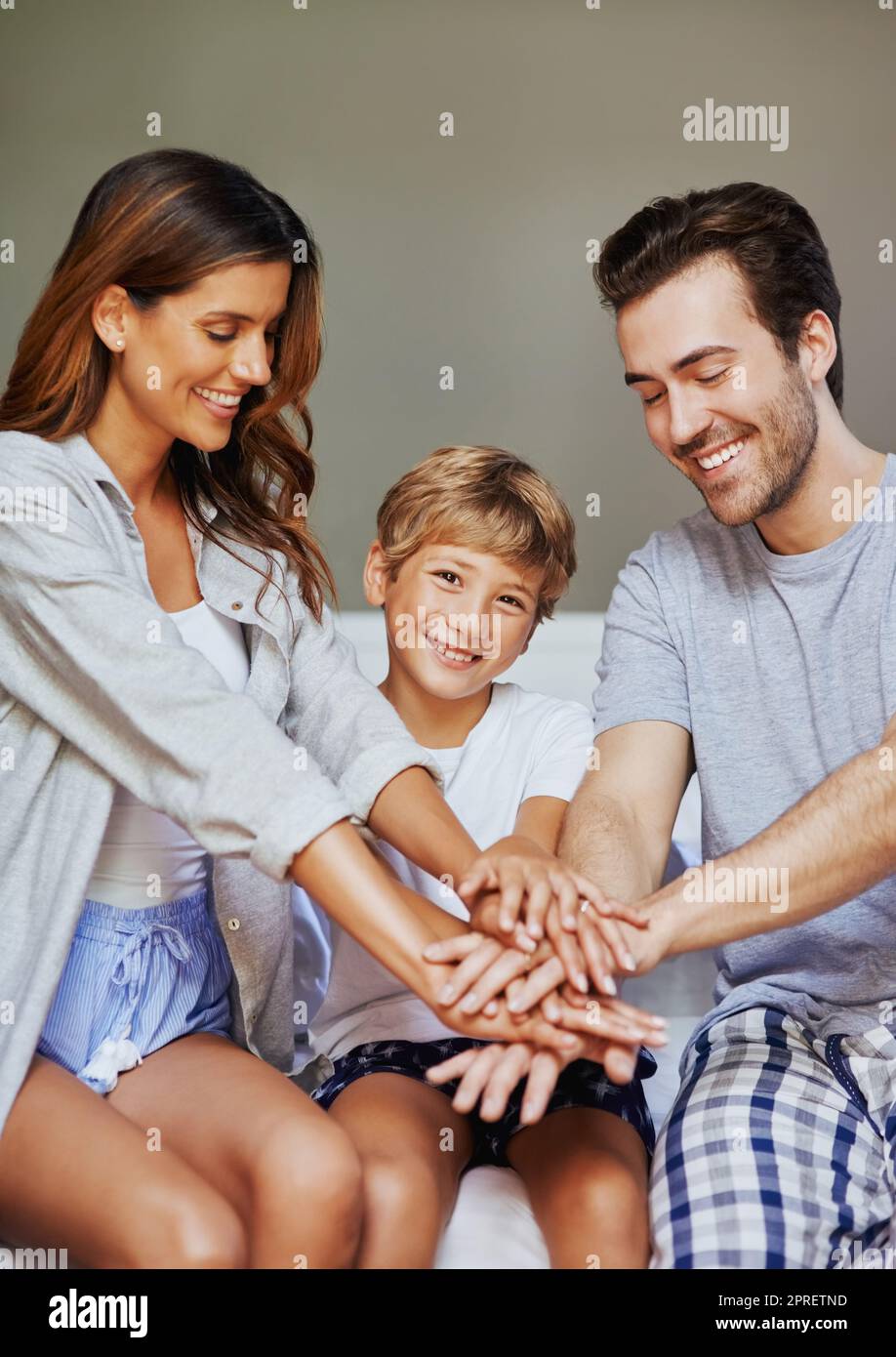 Happy kids huddle hi-res stock photography and images - Alamy