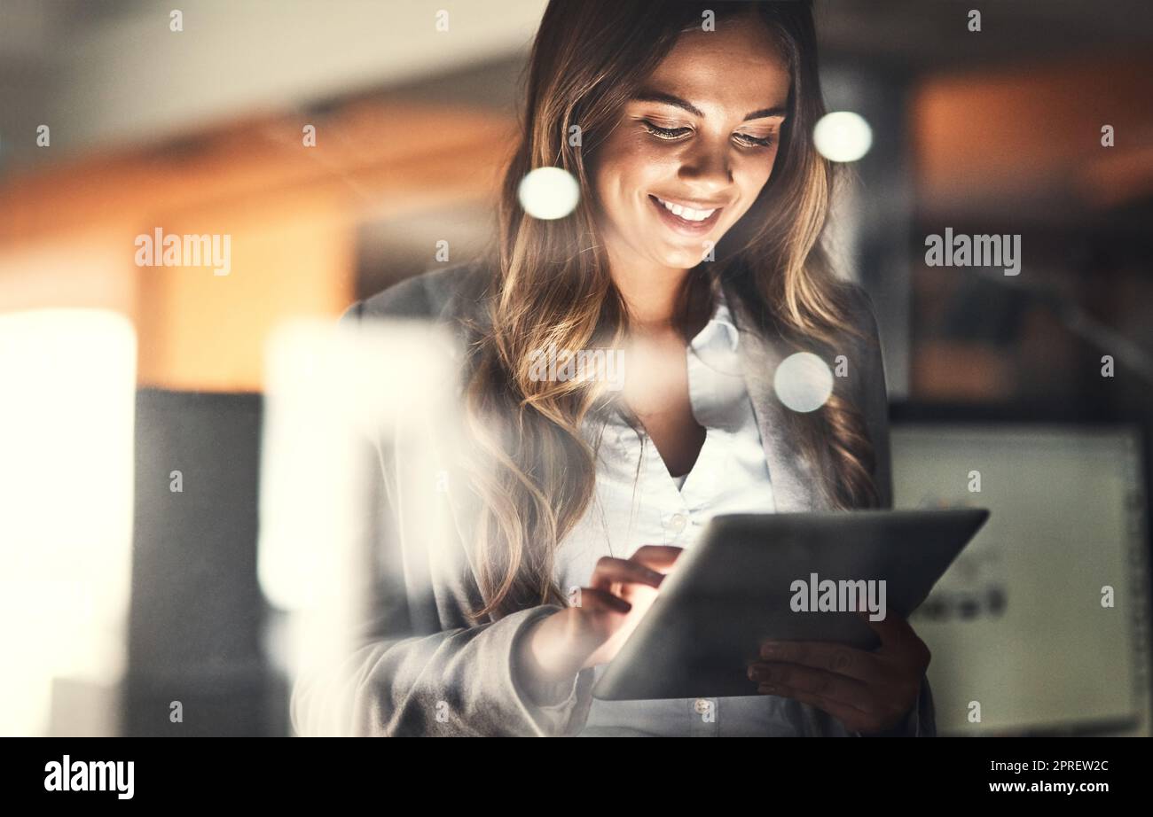 Working late, overtime and dedication with a happy, positive and ...