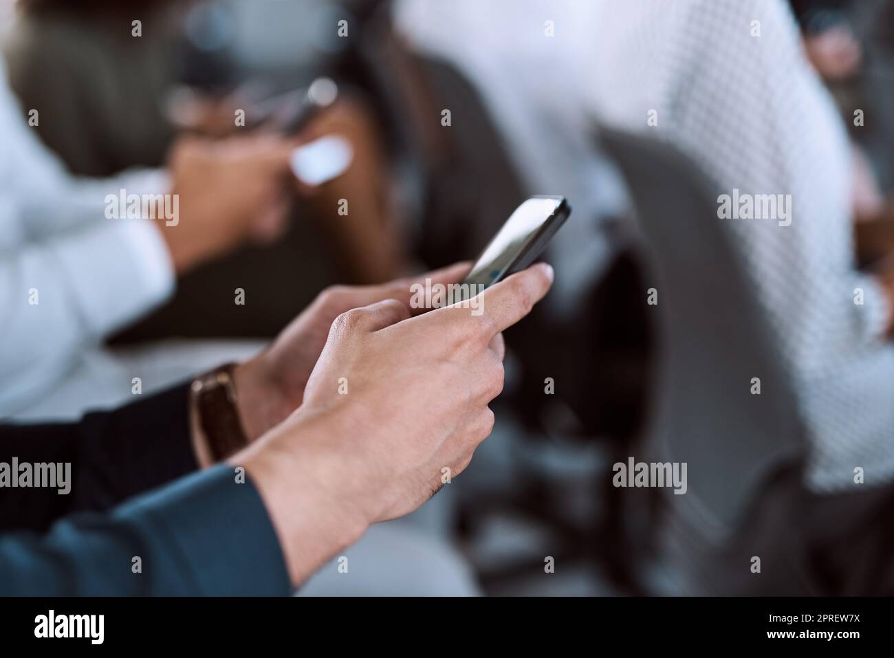 People in modern office mobile phones hi-res stock photography and ...
