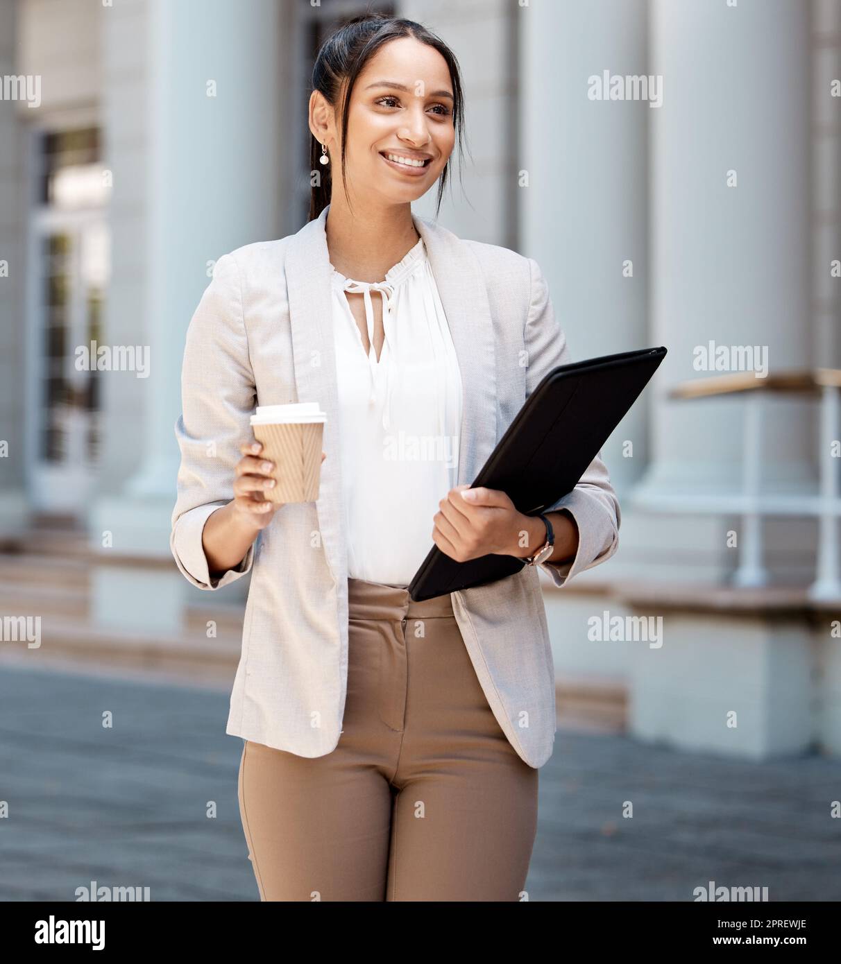Thinking, coffee and business woman walking on a city street with smile ...