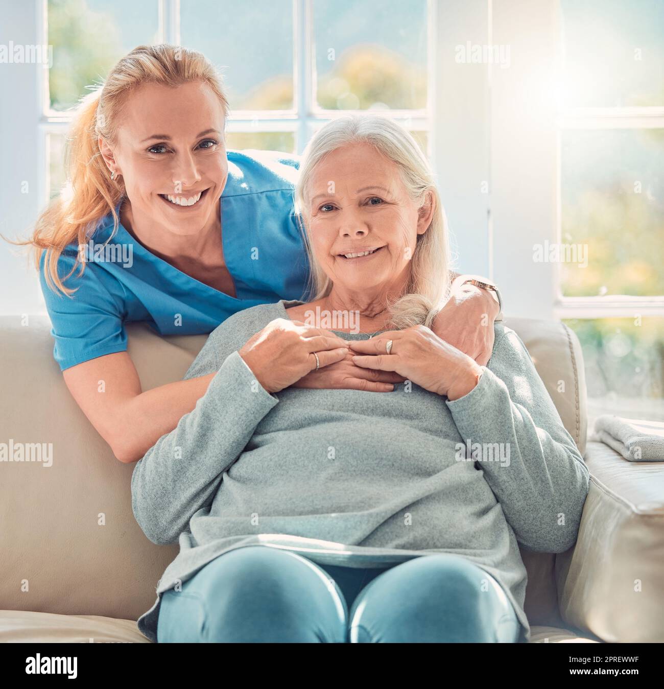 This Work Is My Lifes Joy A Female Nurse Hugging Her Mature Patient