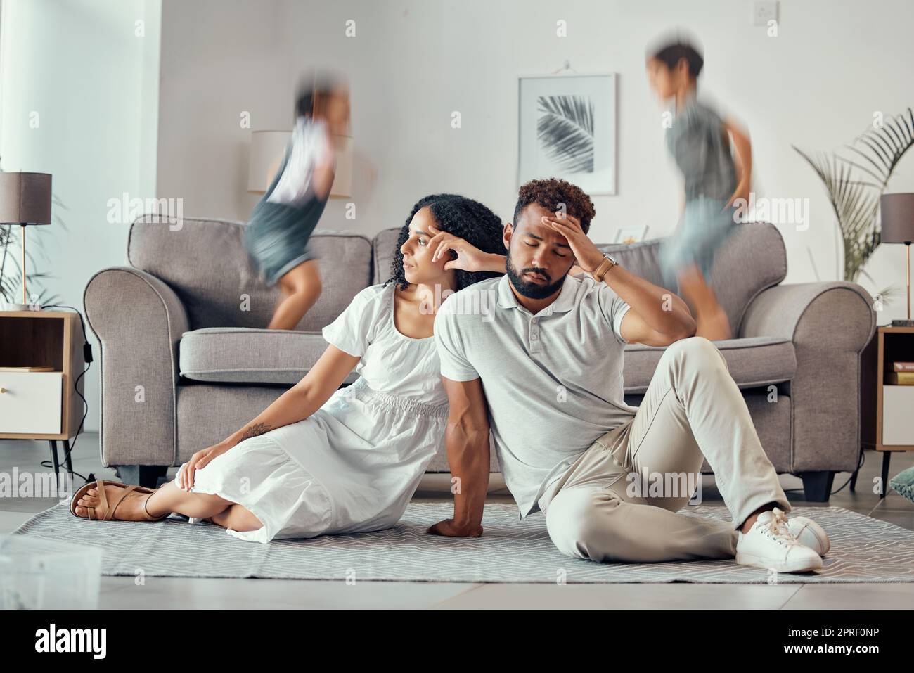 Exhausted parents children jumping hi-res stock photography and images ...