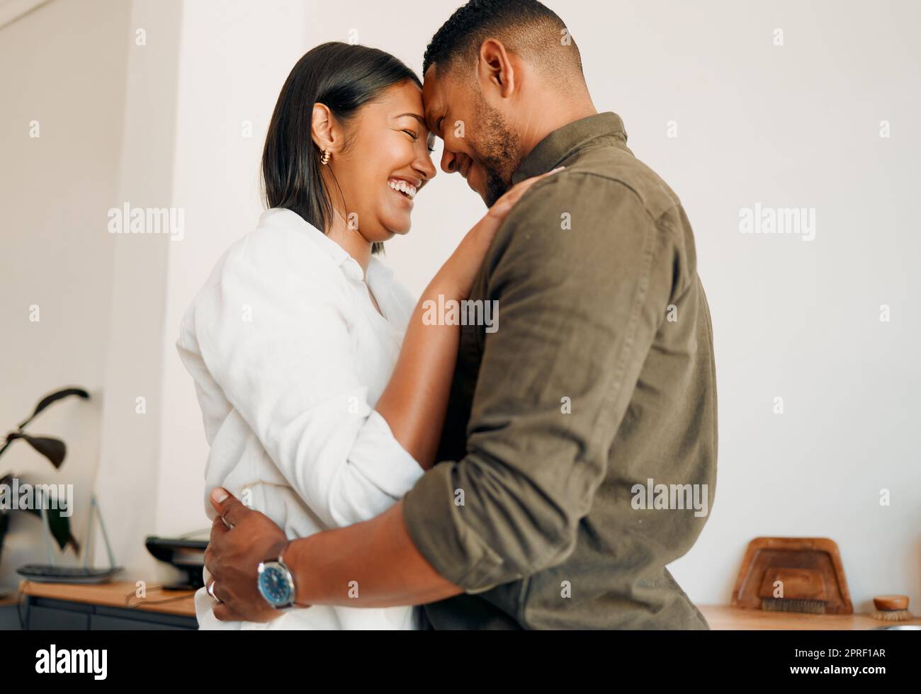 Romantic Laughing And Hugging Couple Bonding Spending Time Together