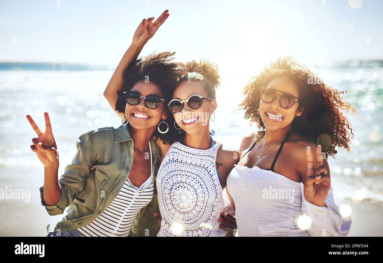 Female friends having fun on the beach hi-res stock photography and ...