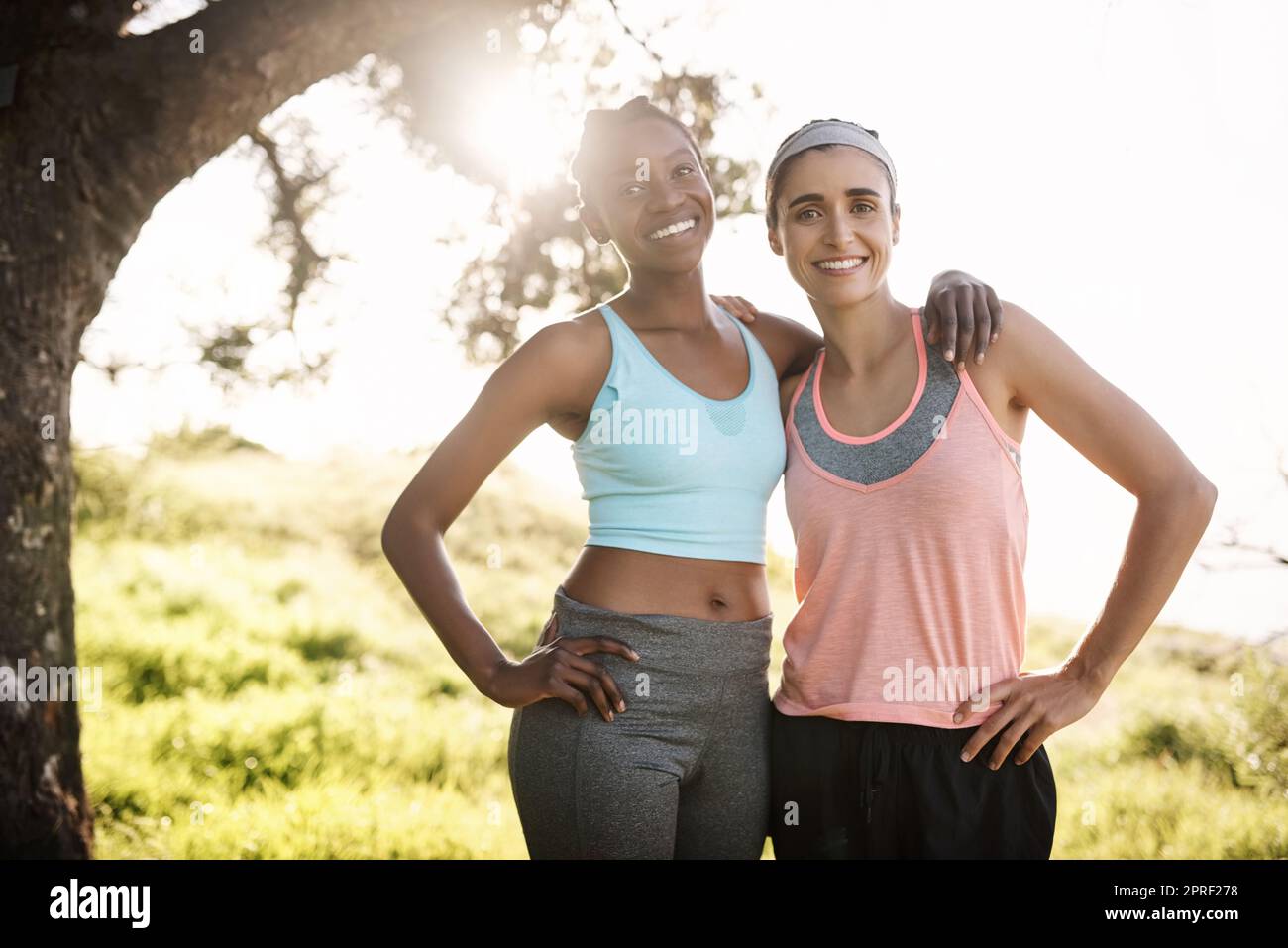 Were staying fit together. two friends out exercising together Stock ...
