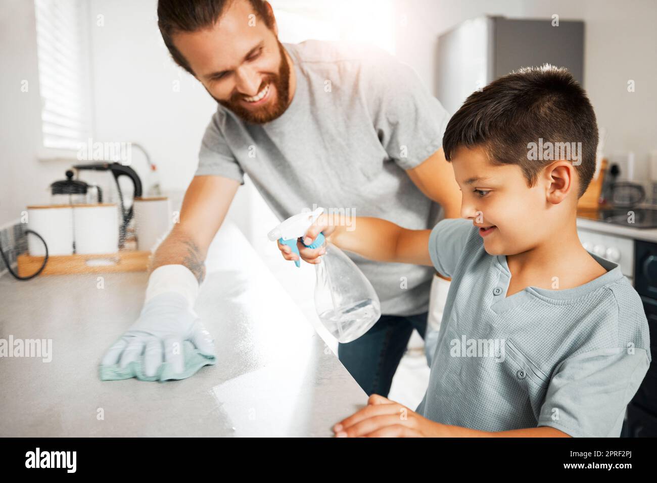 Young child helping father wash hi-res stock photography and images - Alamy