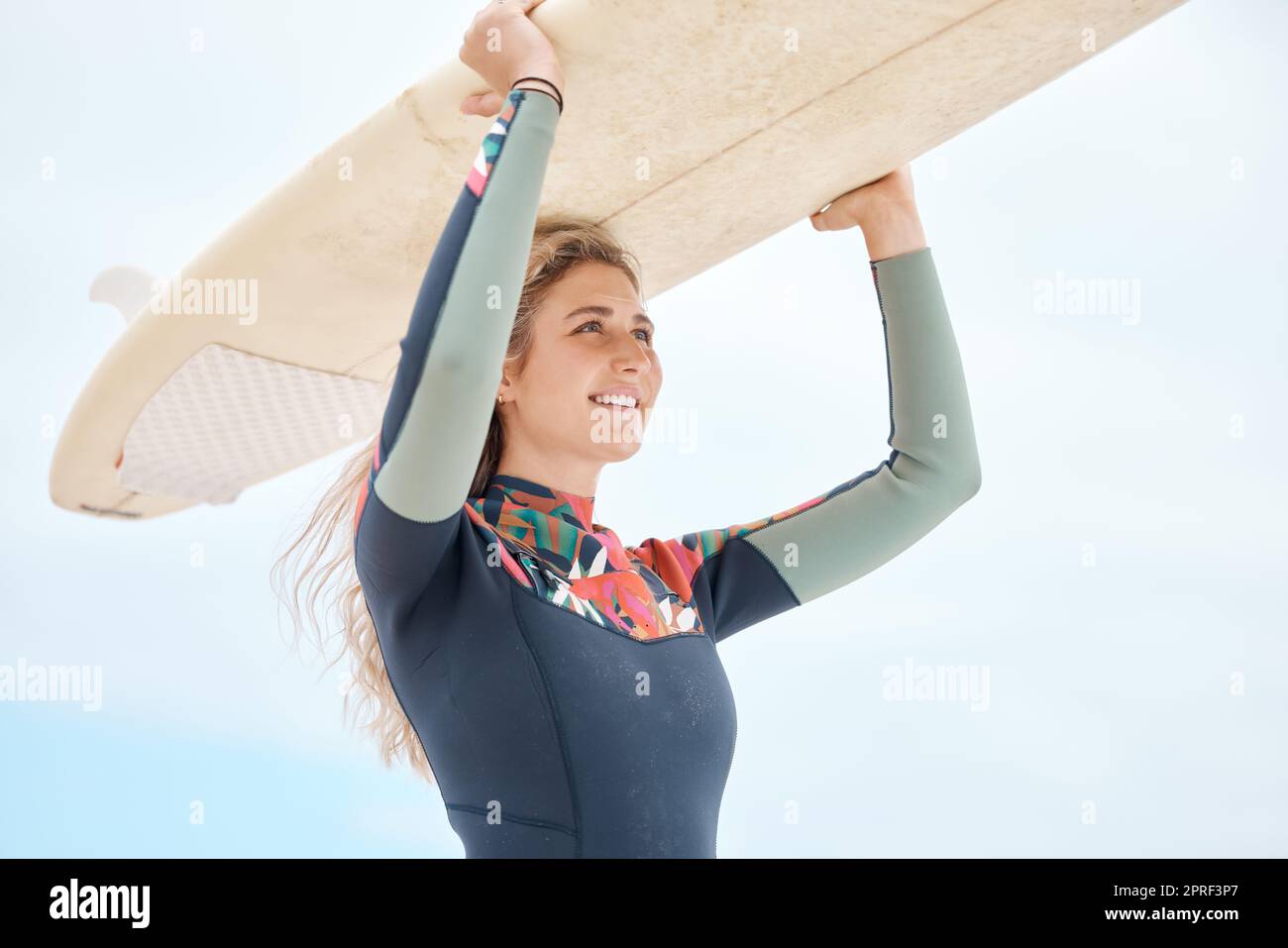 Surf, happy and sports woman surfing athlete with a surfboard ready for ...