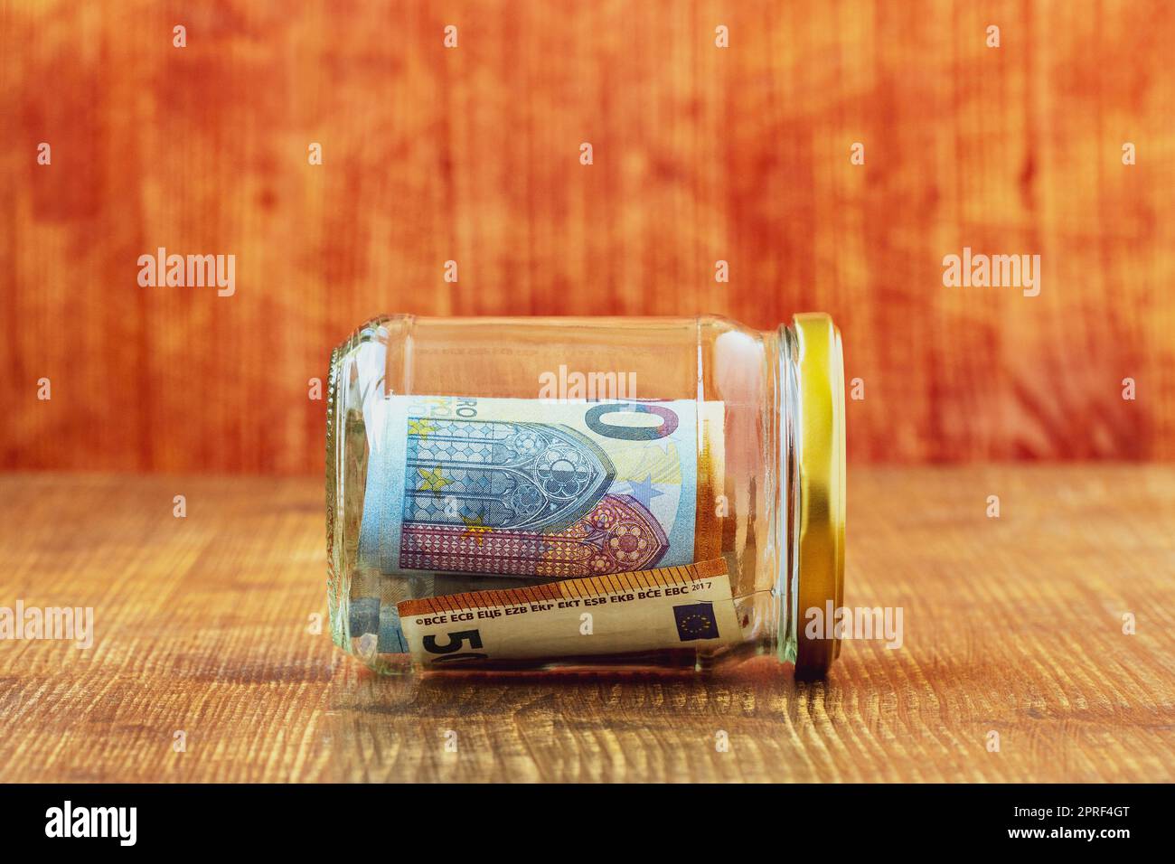 Money jar hi-res stock photography and images - Alamy