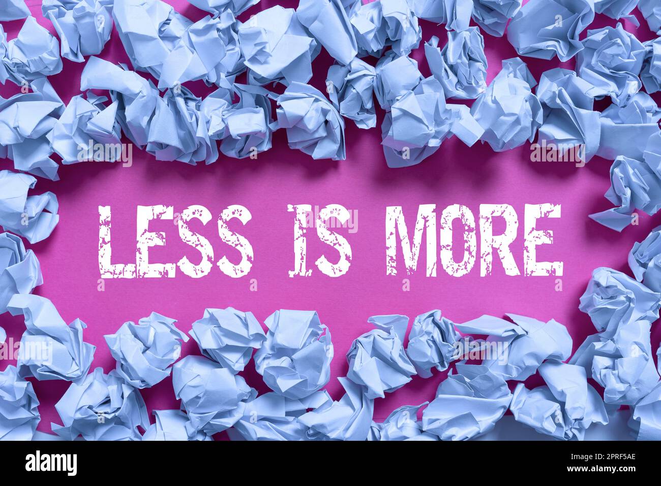 Handwriting text Less Is More. Business overview Minimalist approach to ...