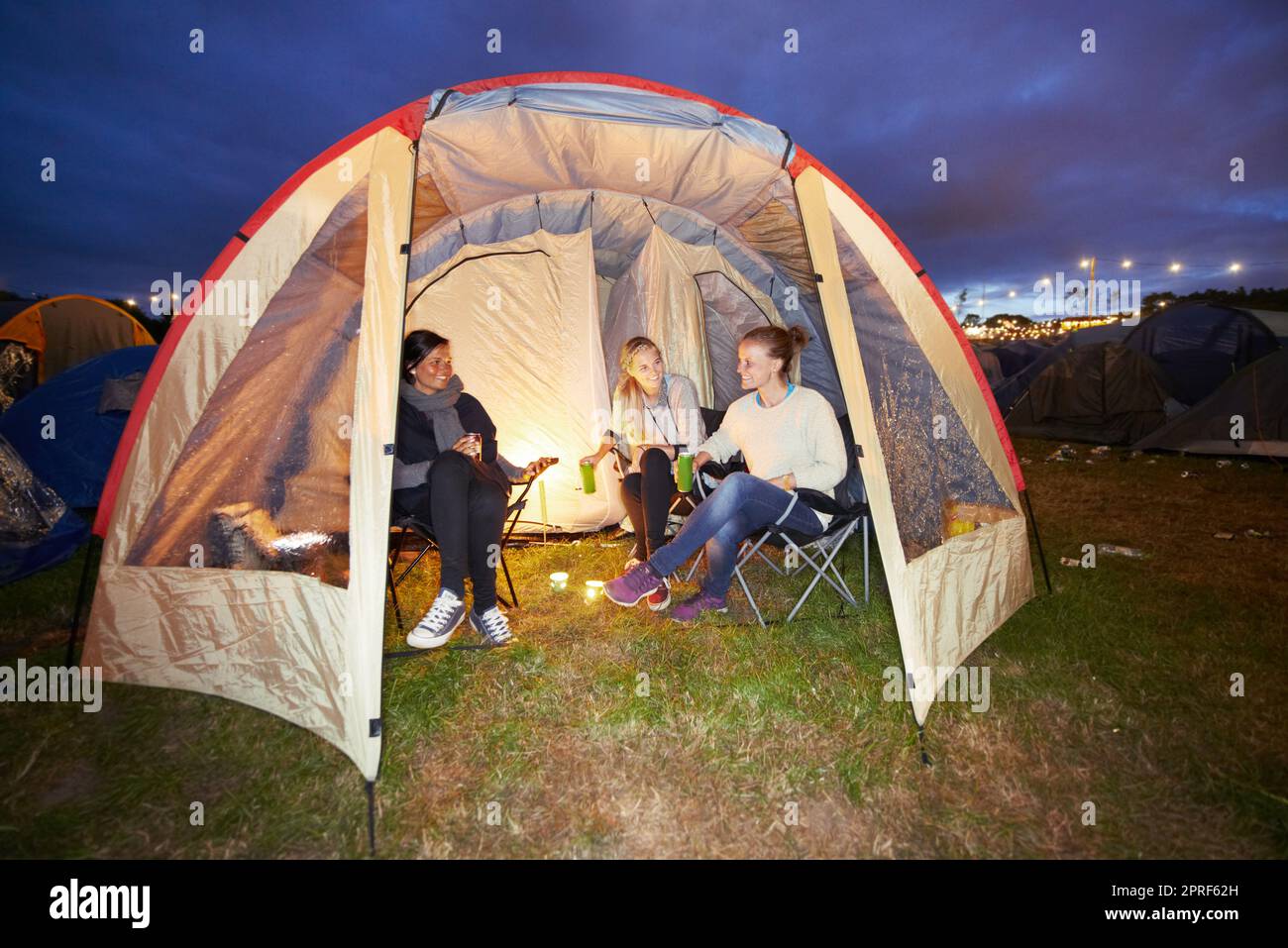 Chilling at camp. a camping ground at a festival Stock Photo - Alamy