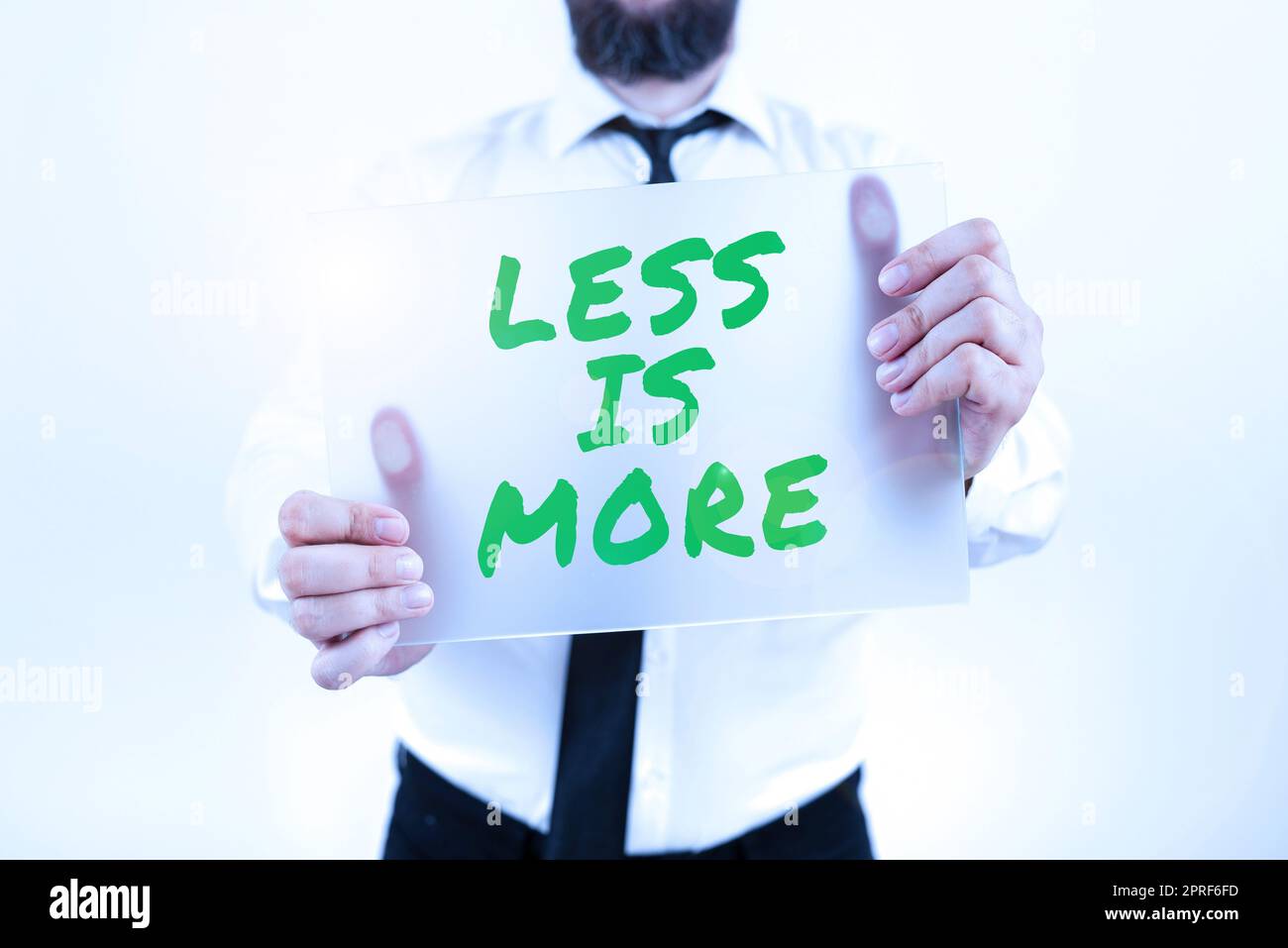 Handwriting text Less Is More. Concept meaning Minimalist approach to ...