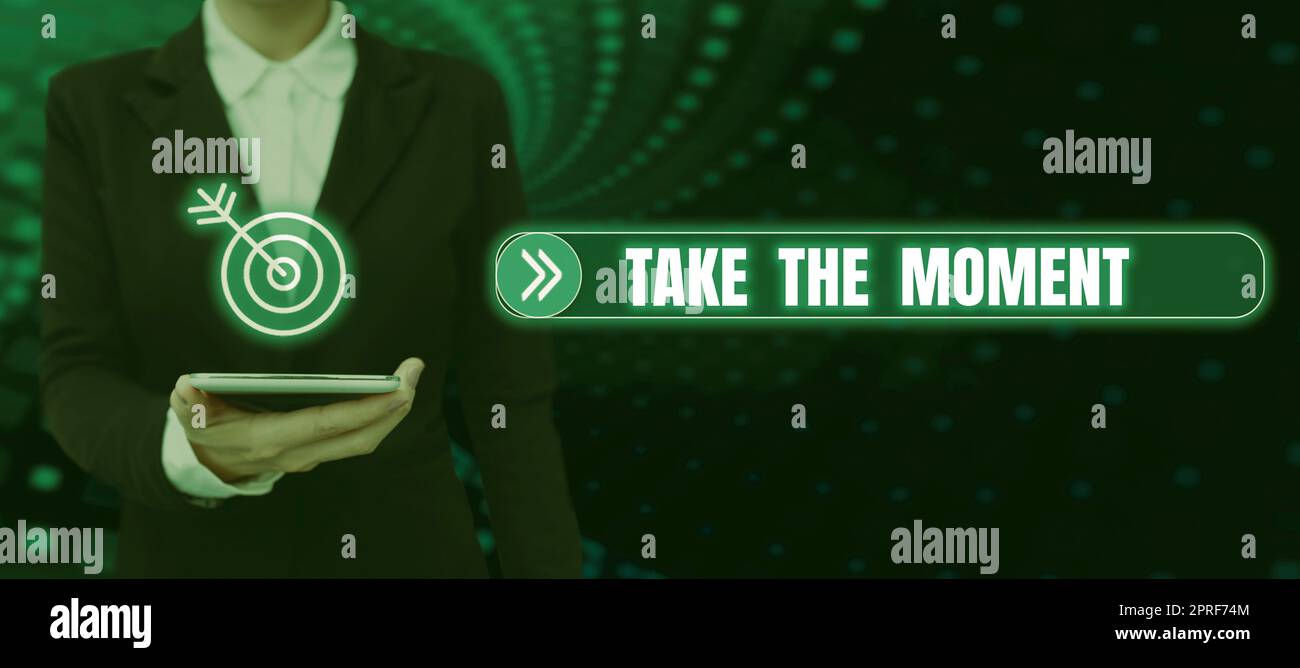 Hand writing sign Take The Moment. Business overview Seize the day and ...