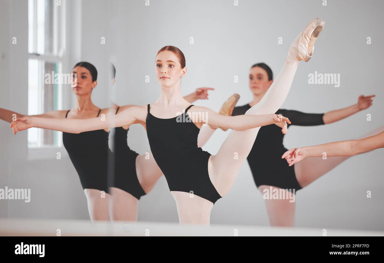 The daring trio. a group of ballet dancers practicing a routine Stock ...
