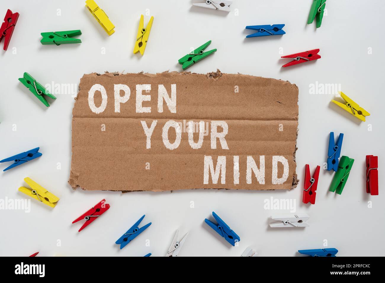 Hand writing sign Open Your Mind. Concept meaning Be openminded Accept ...
