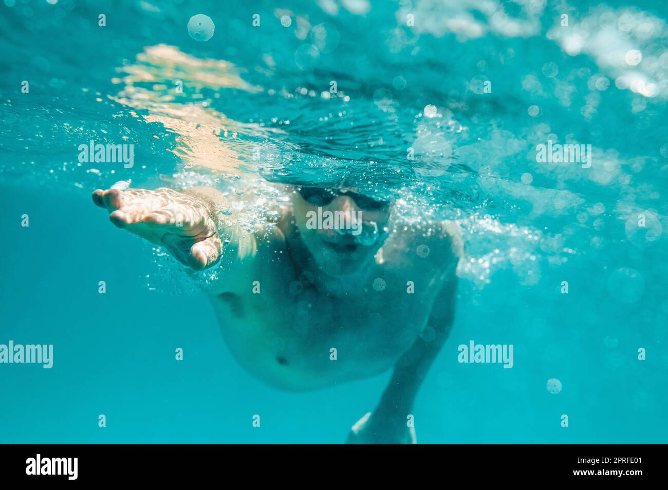 Wet man in swimsuit hi-res stock photography and images - Alamy