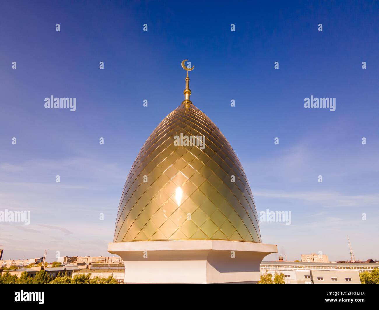 A Muslim golden dome with a crescent moon on the mosque. Minaret ...