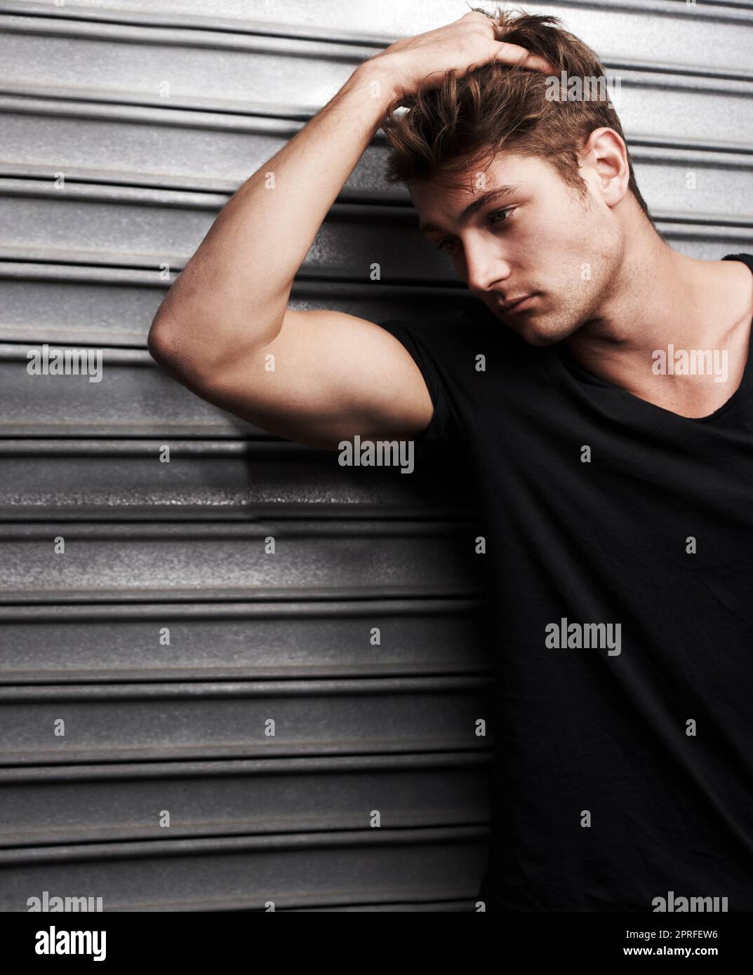 Man running hand through hair hi-res stock photography and images - Alamy
