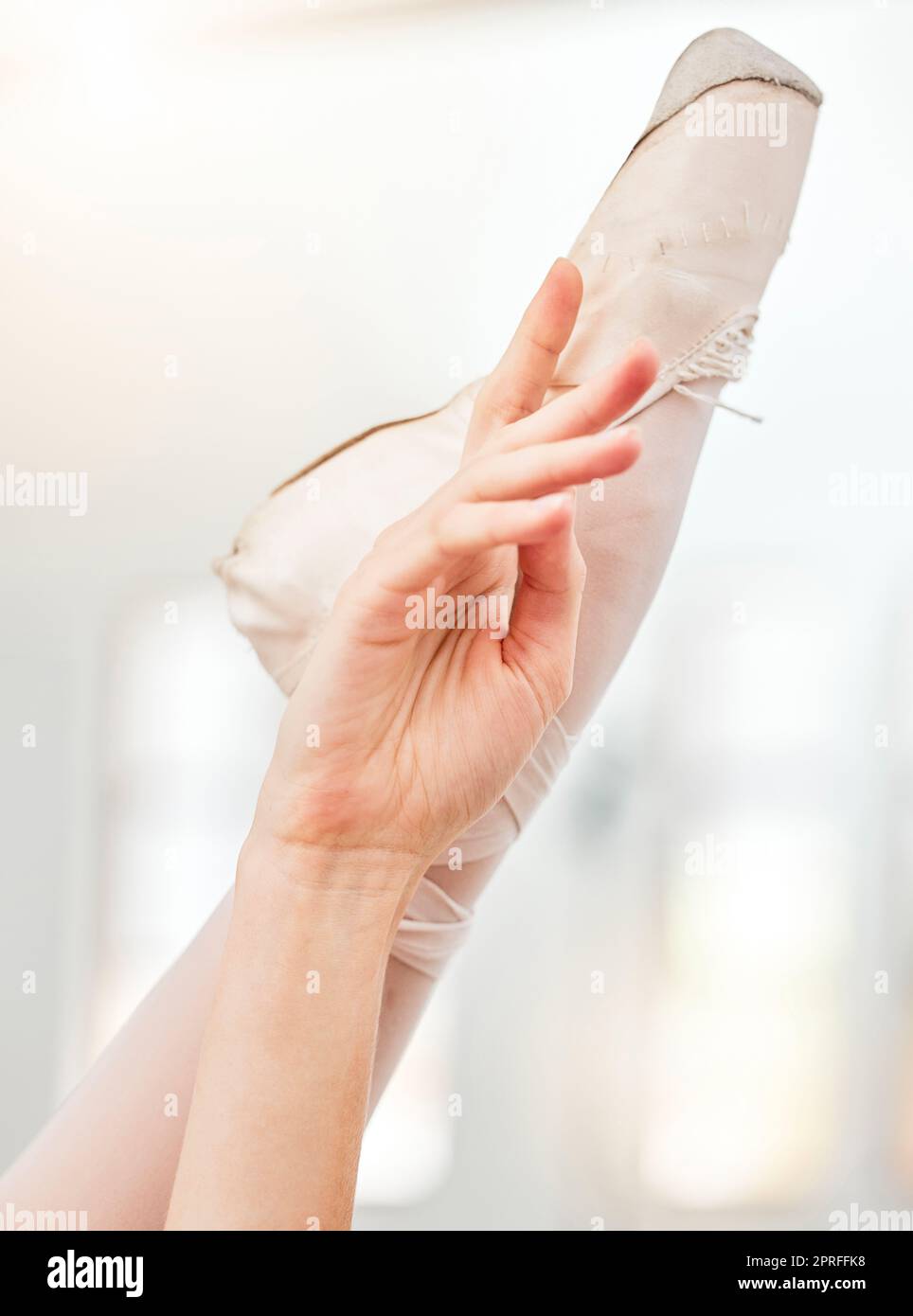 Ballet feet and dance shoes in air for athlete stretching legs for ...