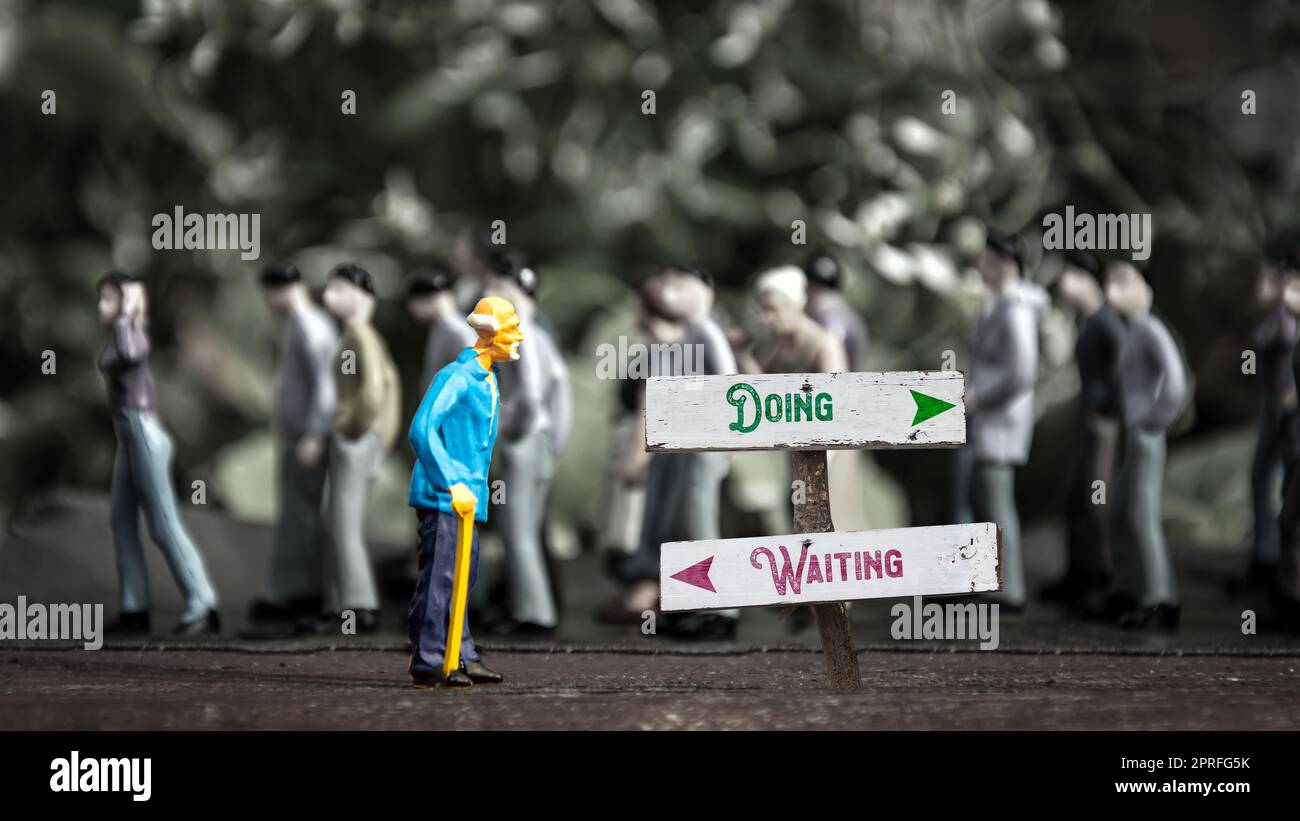 Street Sign the Direction Way to Doing versus Waiting Stock Photo - Alamy