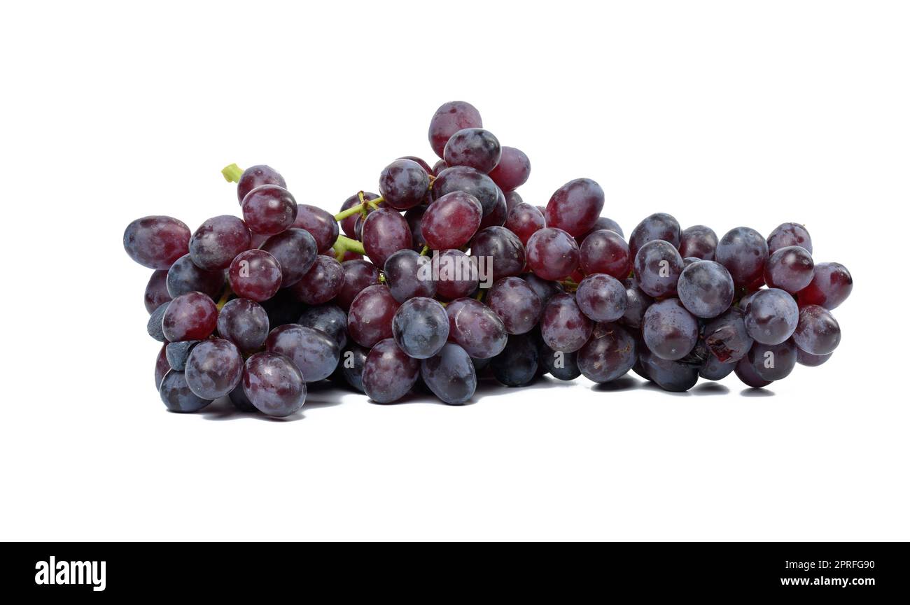 Ripe red grapes on a white isolated background Stock Photo - Alamy